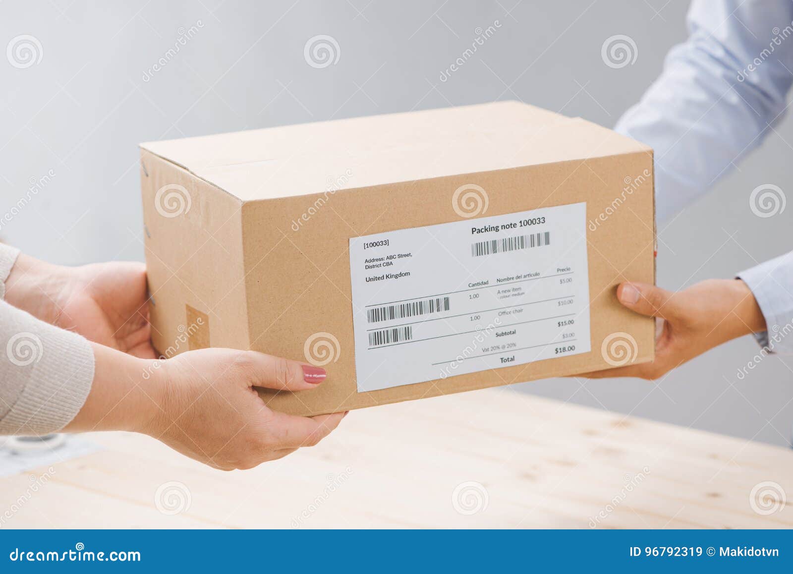 Woman Receiving Package from a Delivery Man Stock Image - Image of ...