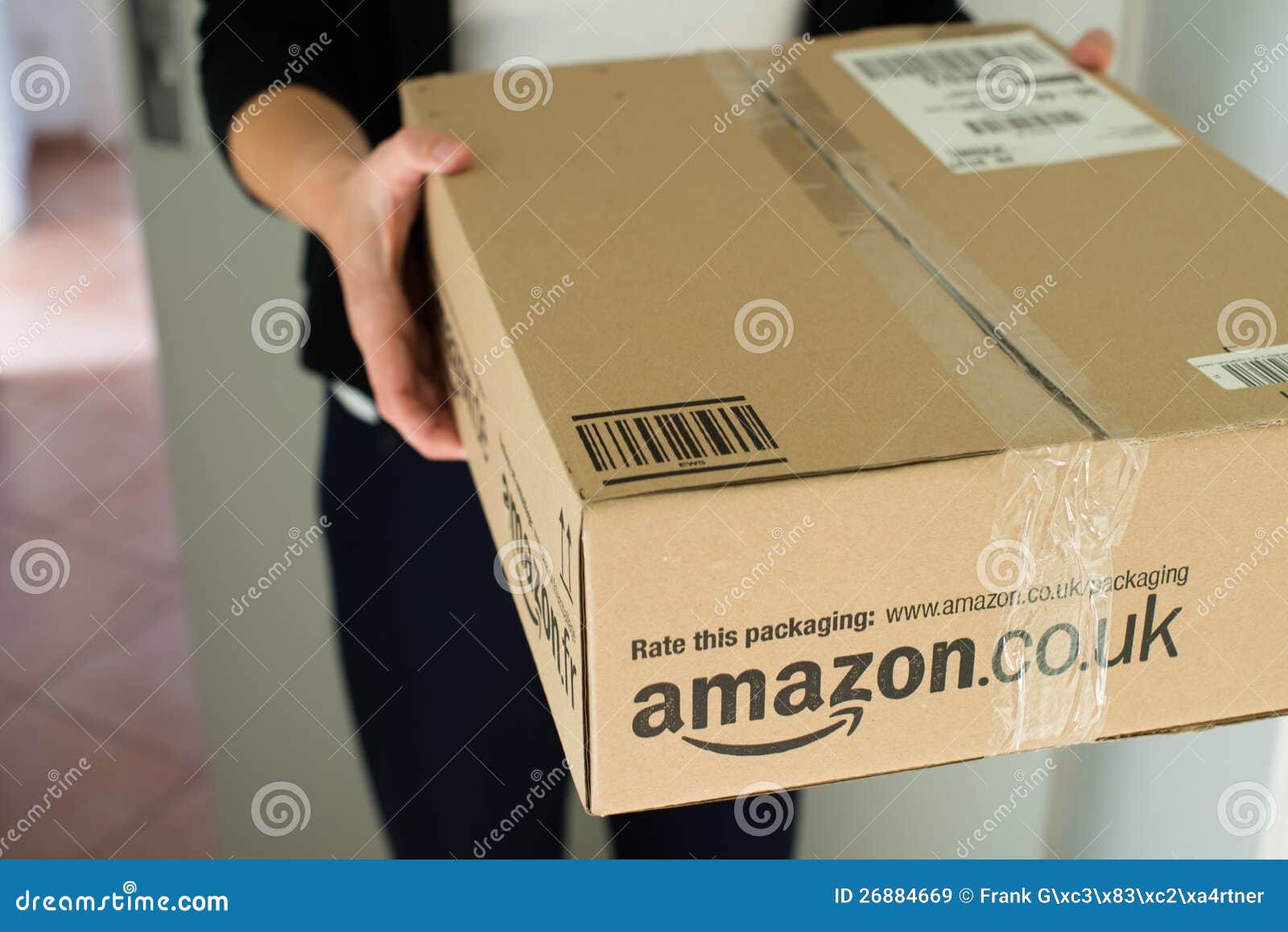 Woman receiving parcel editorial stock image. Image of female - 26884669