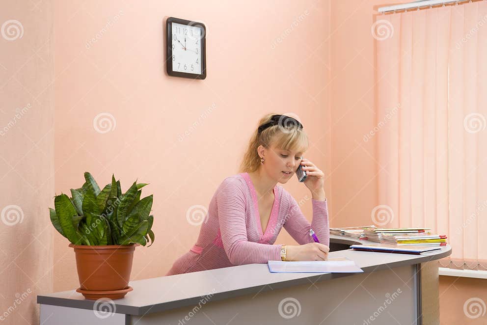 Woman Receptionist Write a Note Stock Image - Image of lobby, desk: 5178123
