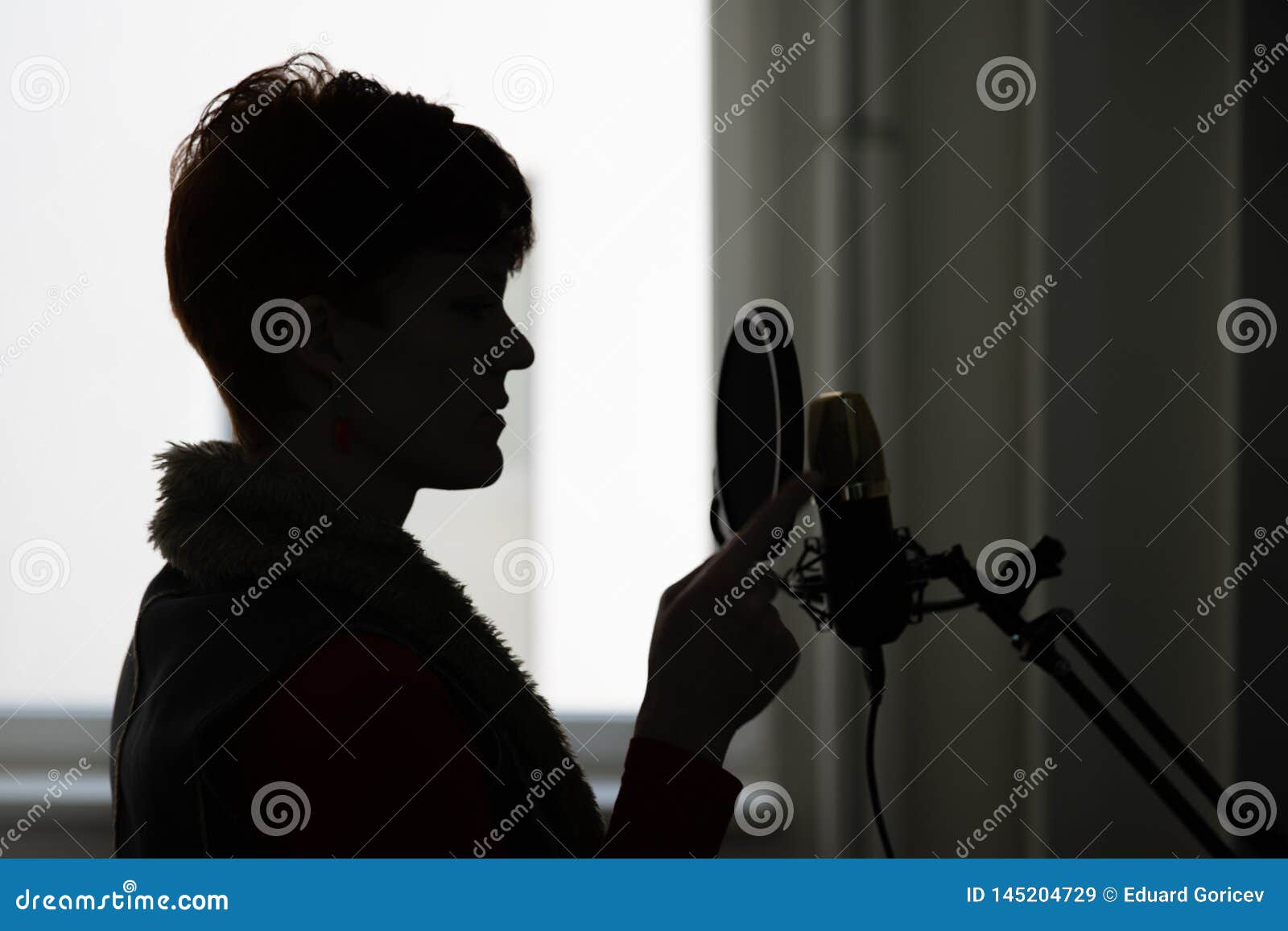 Woman in Recording Studio Recording Singing and Speaking for Processing ...