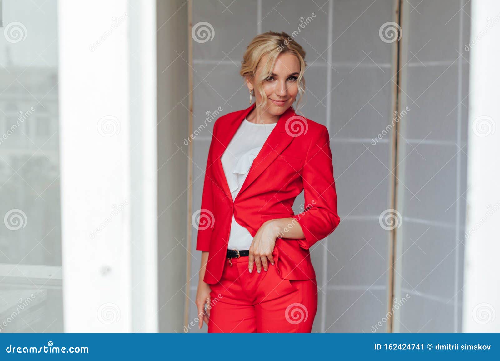 Business Woman in Red Business Suit in the Office Stock Image - Image ...