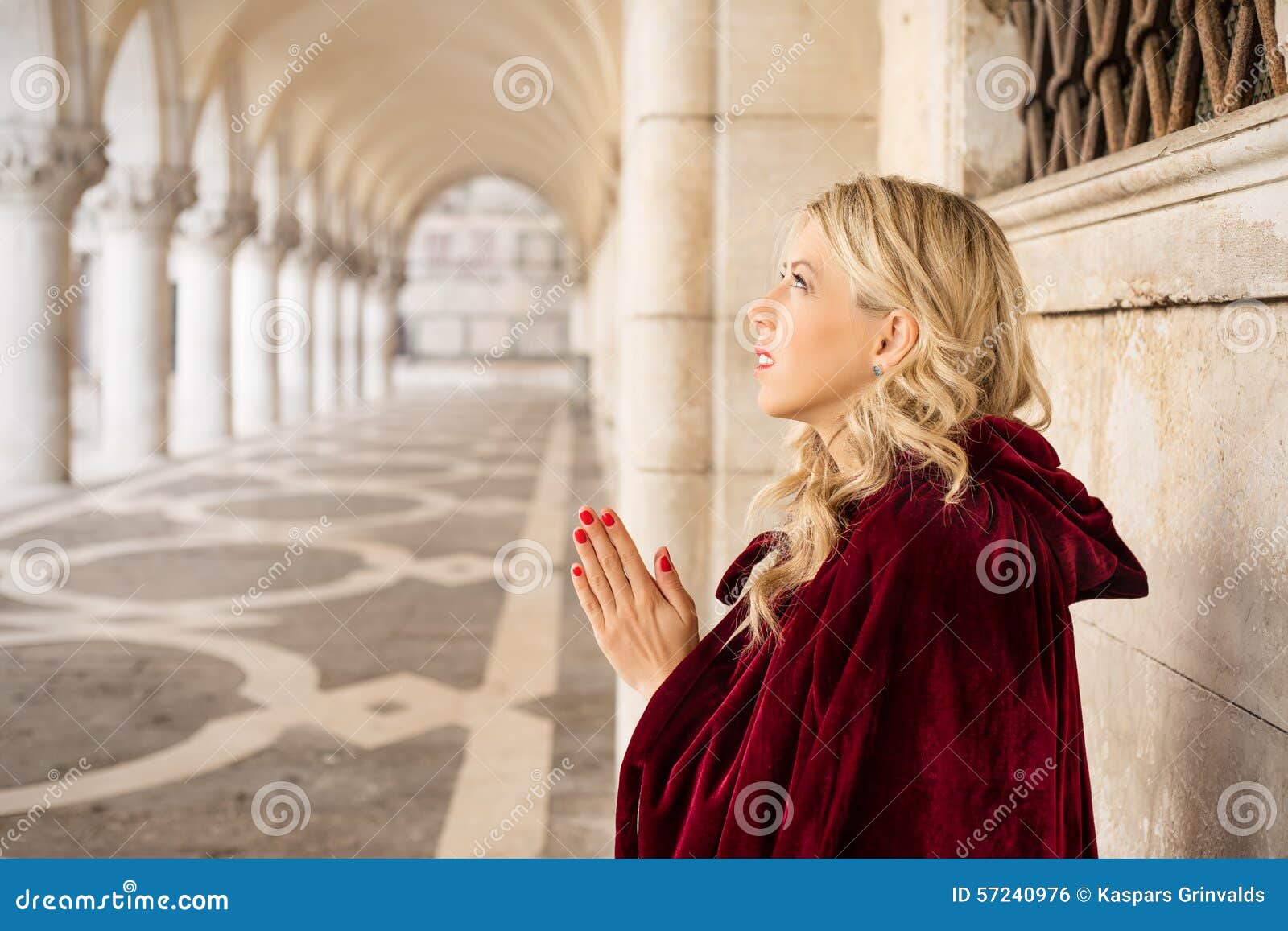Woman in red cloak pray stock photo. Image of back, cloak - 57240976