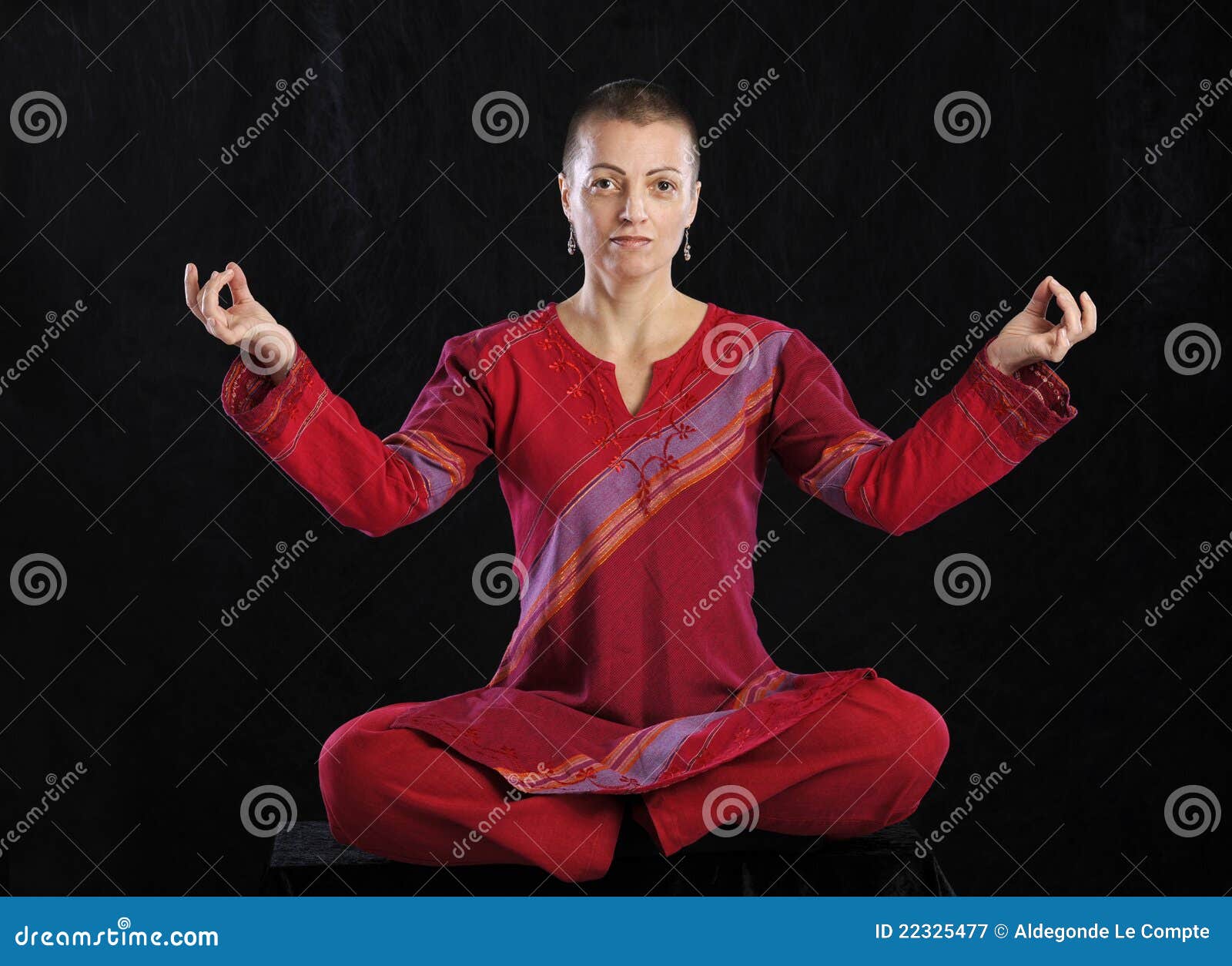 Woman in red doing yoga stock image. Image of seated - 22325477