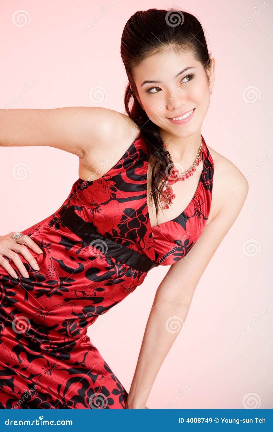 Woman in red dress smiling stock image. Image of beautiful - 4008749