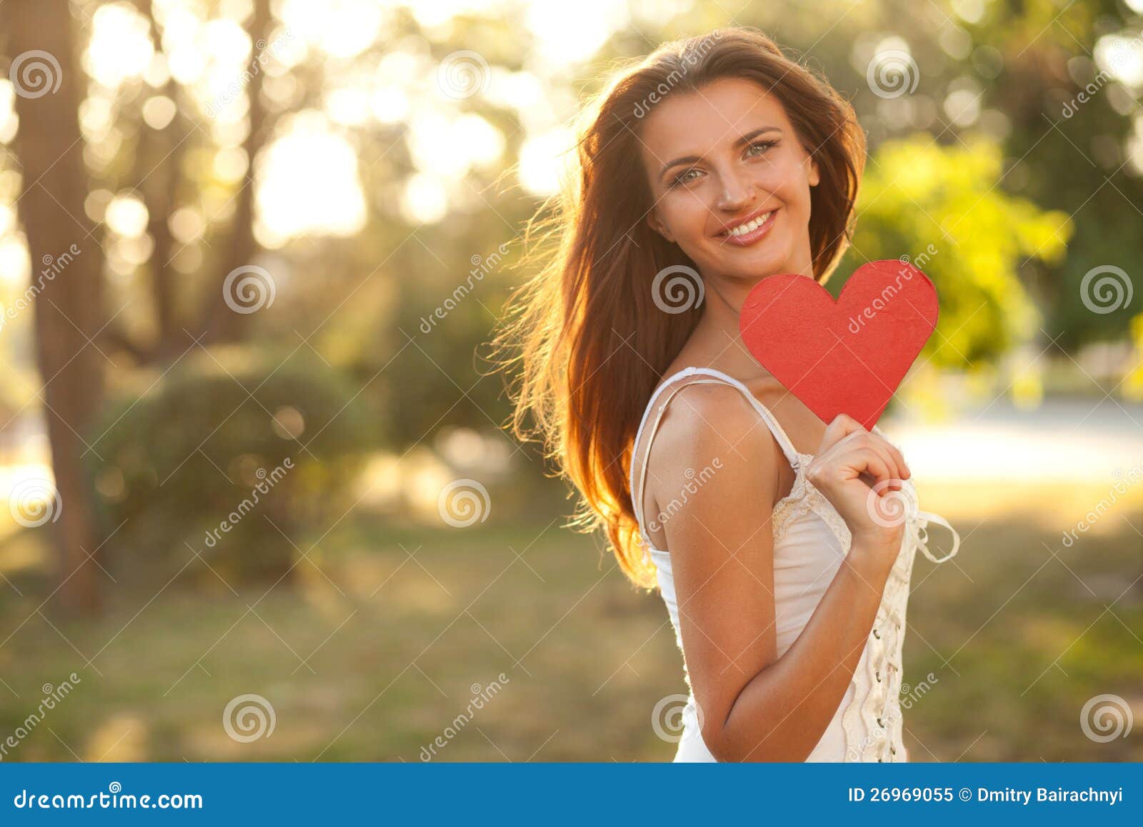 Woman with red heart stock image. Image of attractive - 26969055