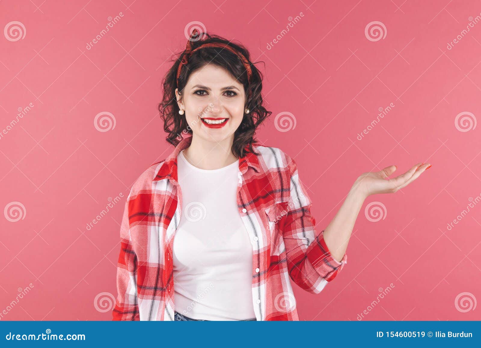 Woman with Red Lips Pointing Something in Colored Studio. Stock Image ...