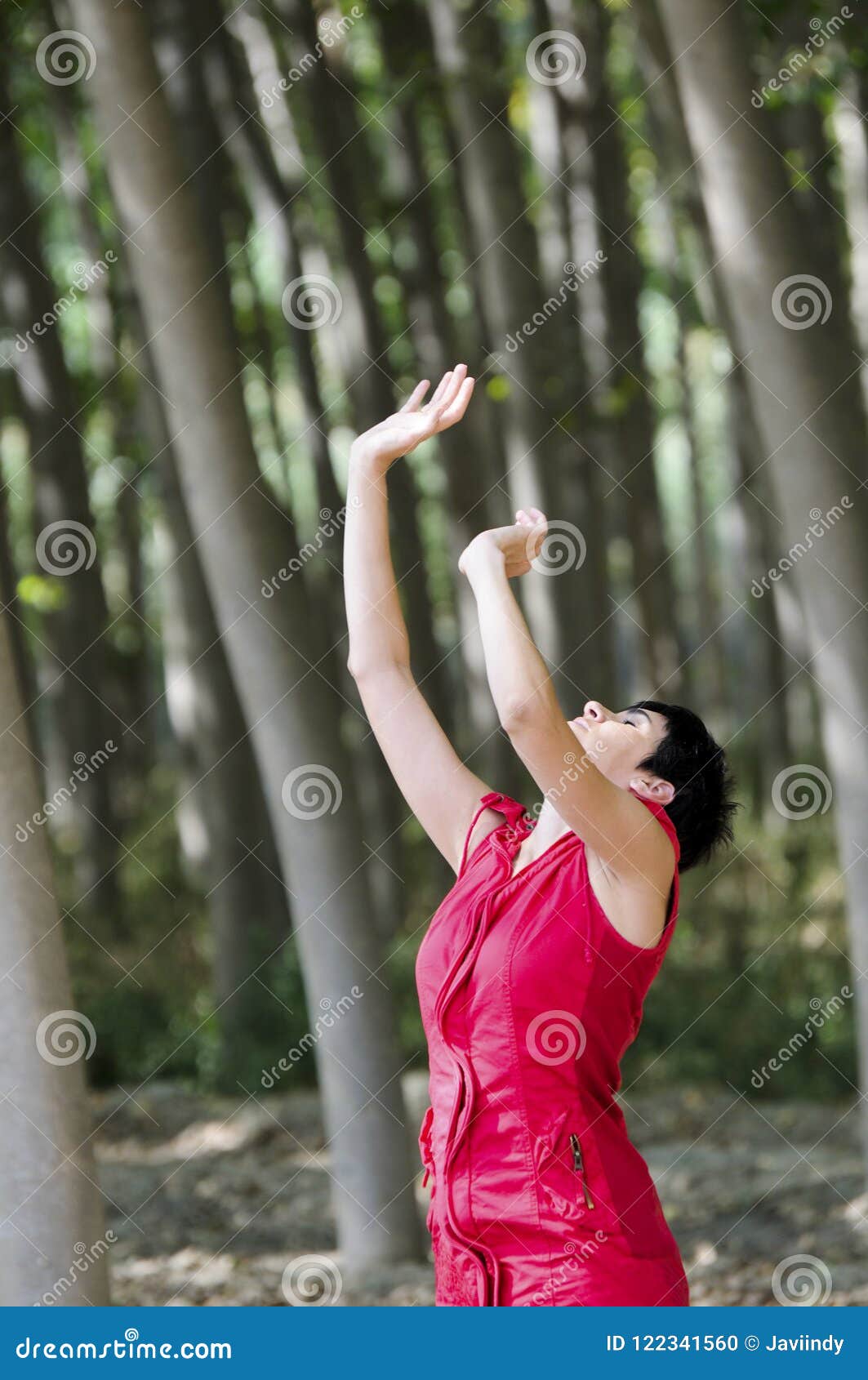 Woman in Red, Meditating in the Forest Stock Photo - Image of aspen ...