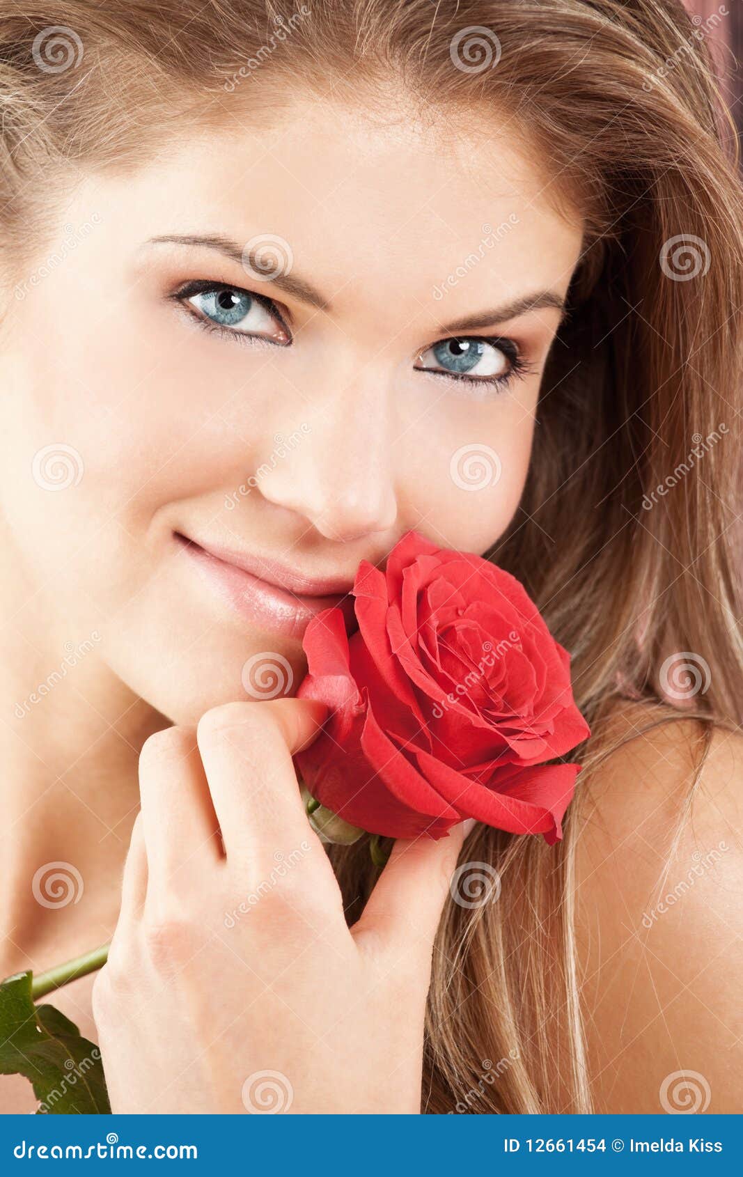 Woman with red rose stock photo. Image of portrait, female - 12661454