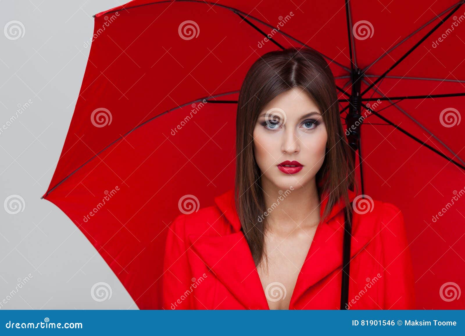 Woman with red umbrella stock photo. Image of people - 81901546