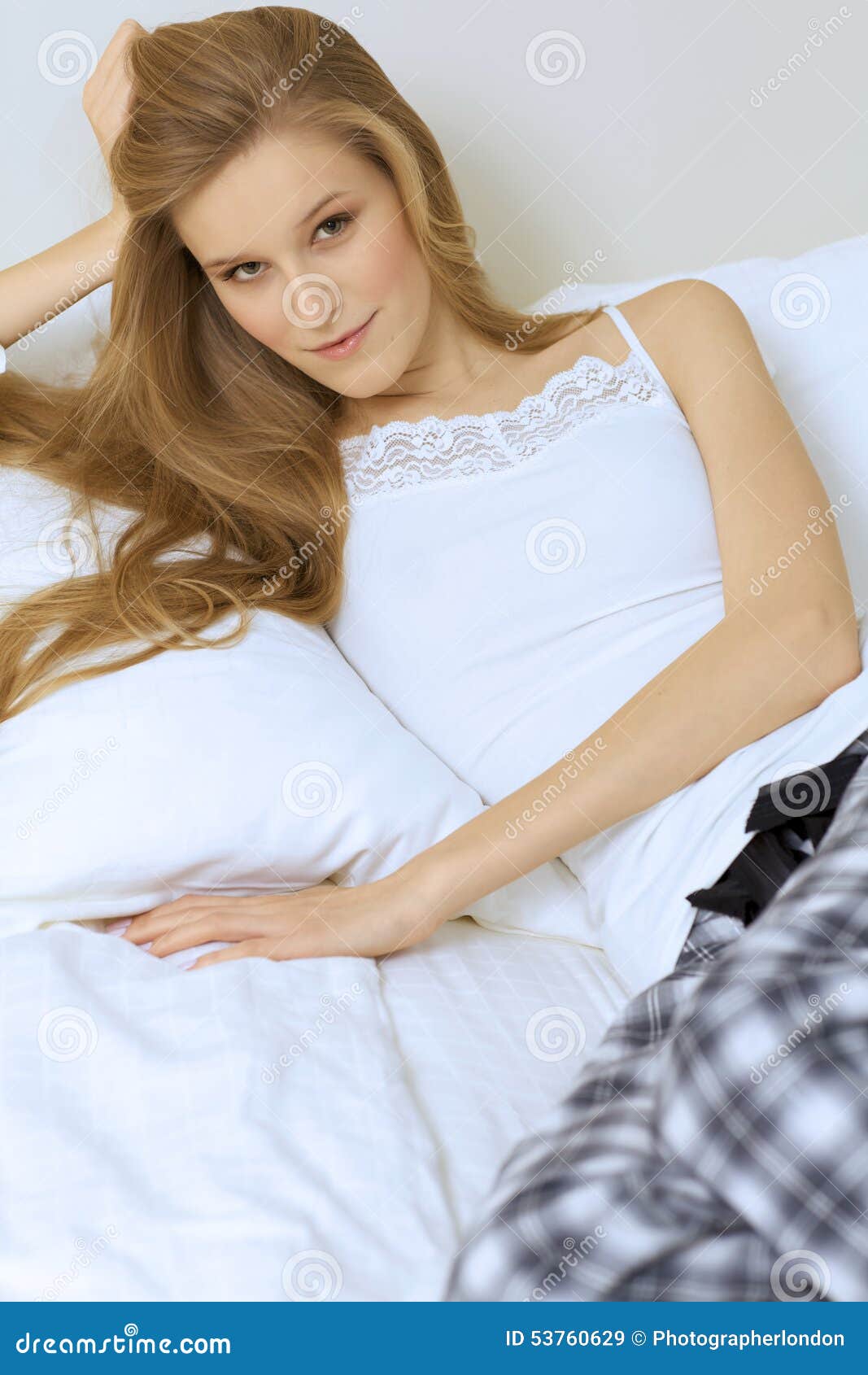 Woman relaxing in bed stock image. Image of contact, leisure - 53760629