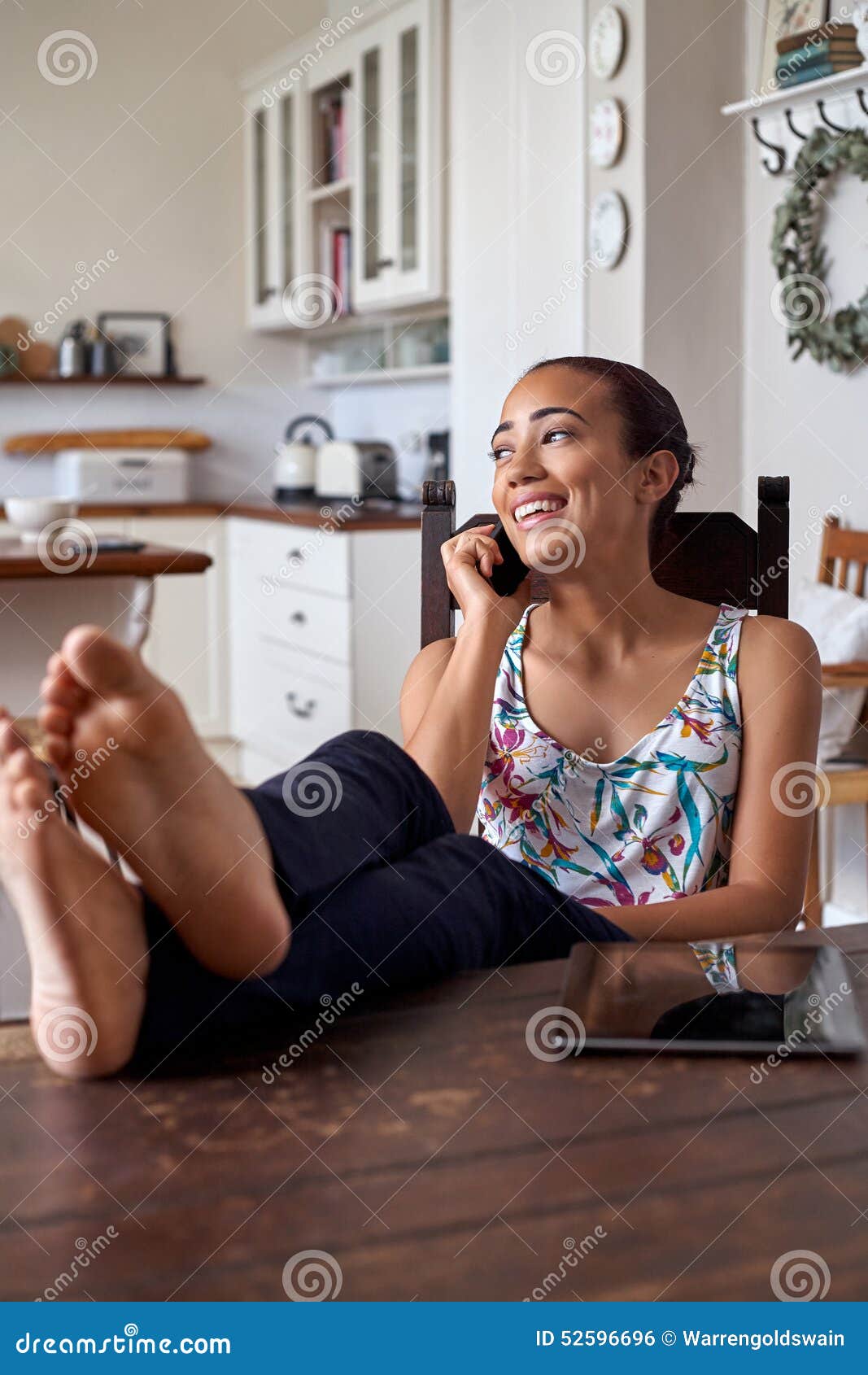 Woman relaxing cellphone stock photo. Image of home, lifestyle - 52596696