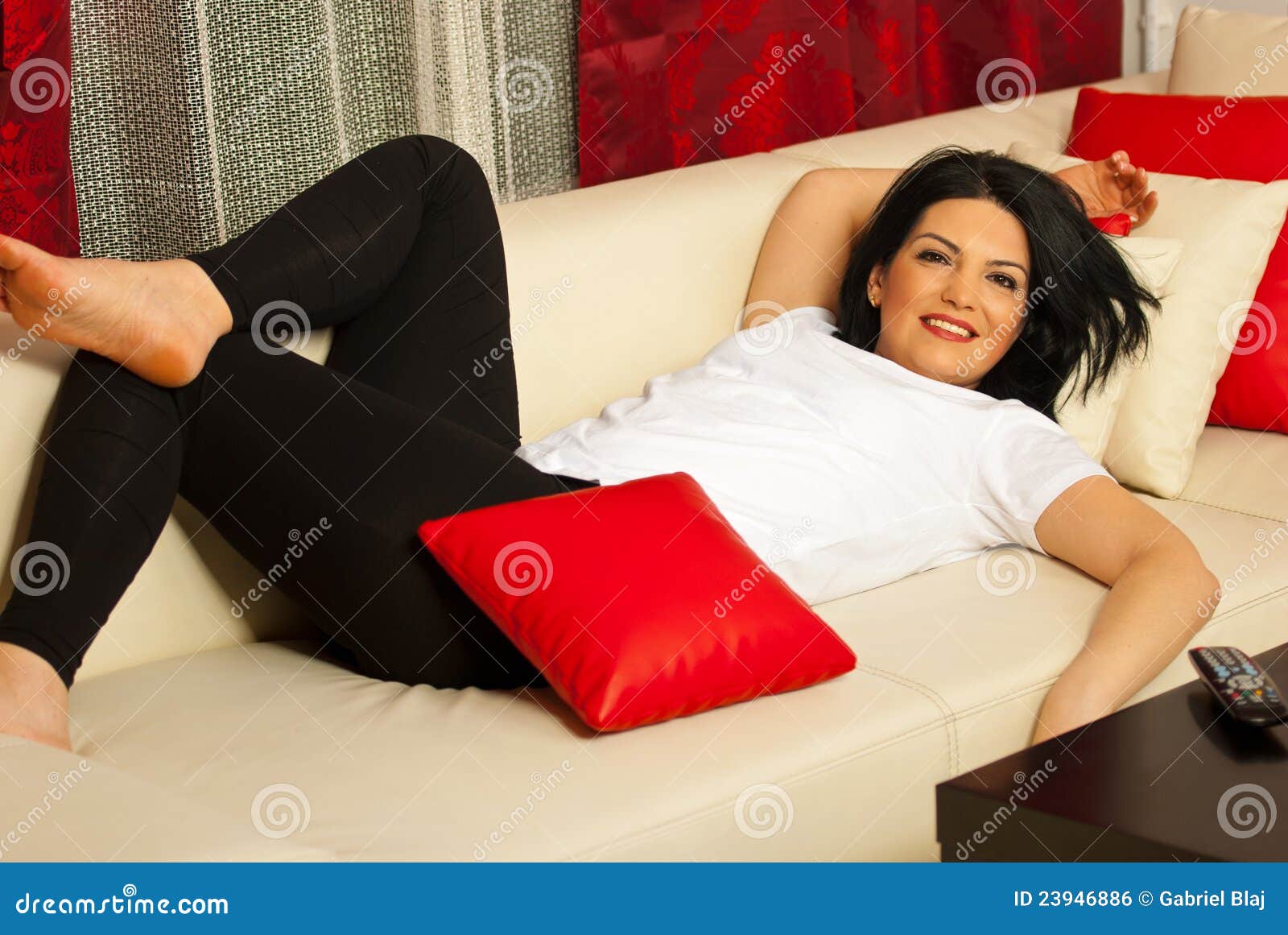 Woman relaxing on couch stock photo. Image of caucasian - 23946886