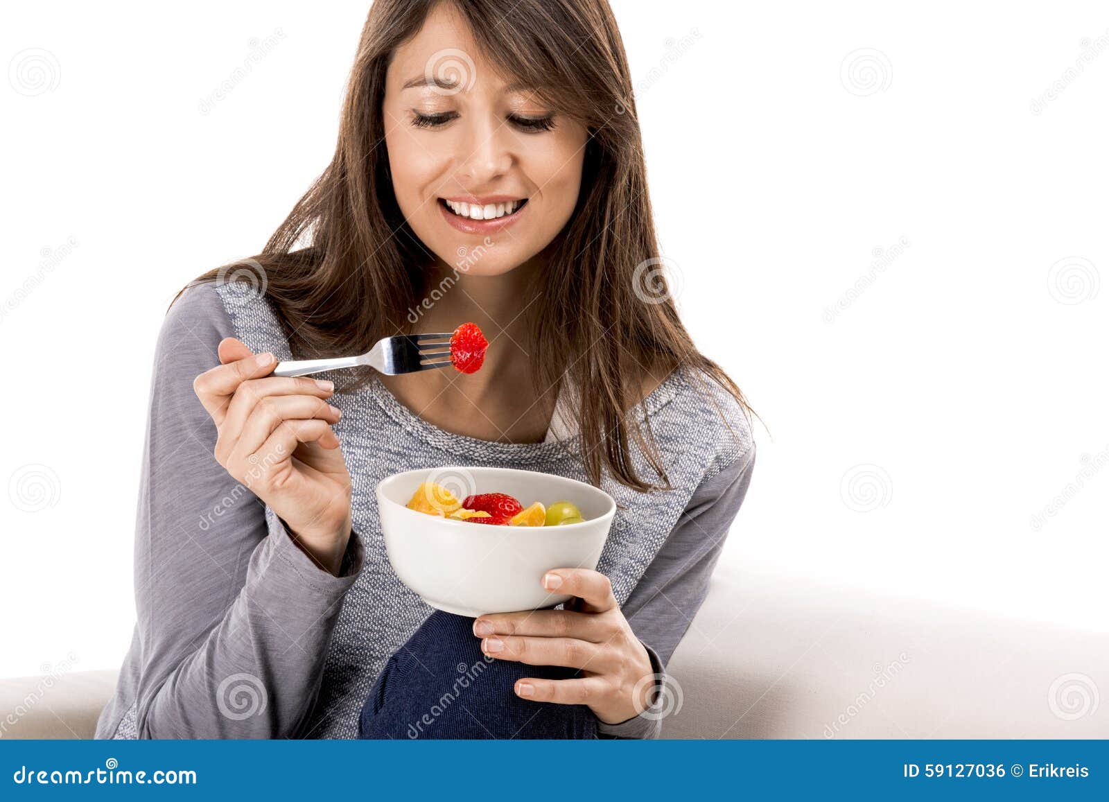 Woman relaxing and eating stock photo. Image of house - 59127036