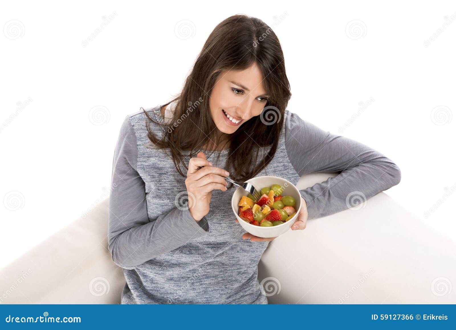 Woman relaxing and eating stock photo. Image of house - 59127366