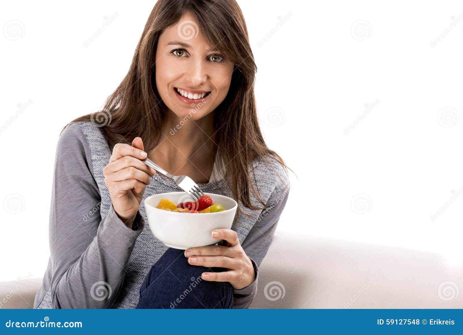 Woman relaxing and eating stock photo. Image of grapes - 59127548