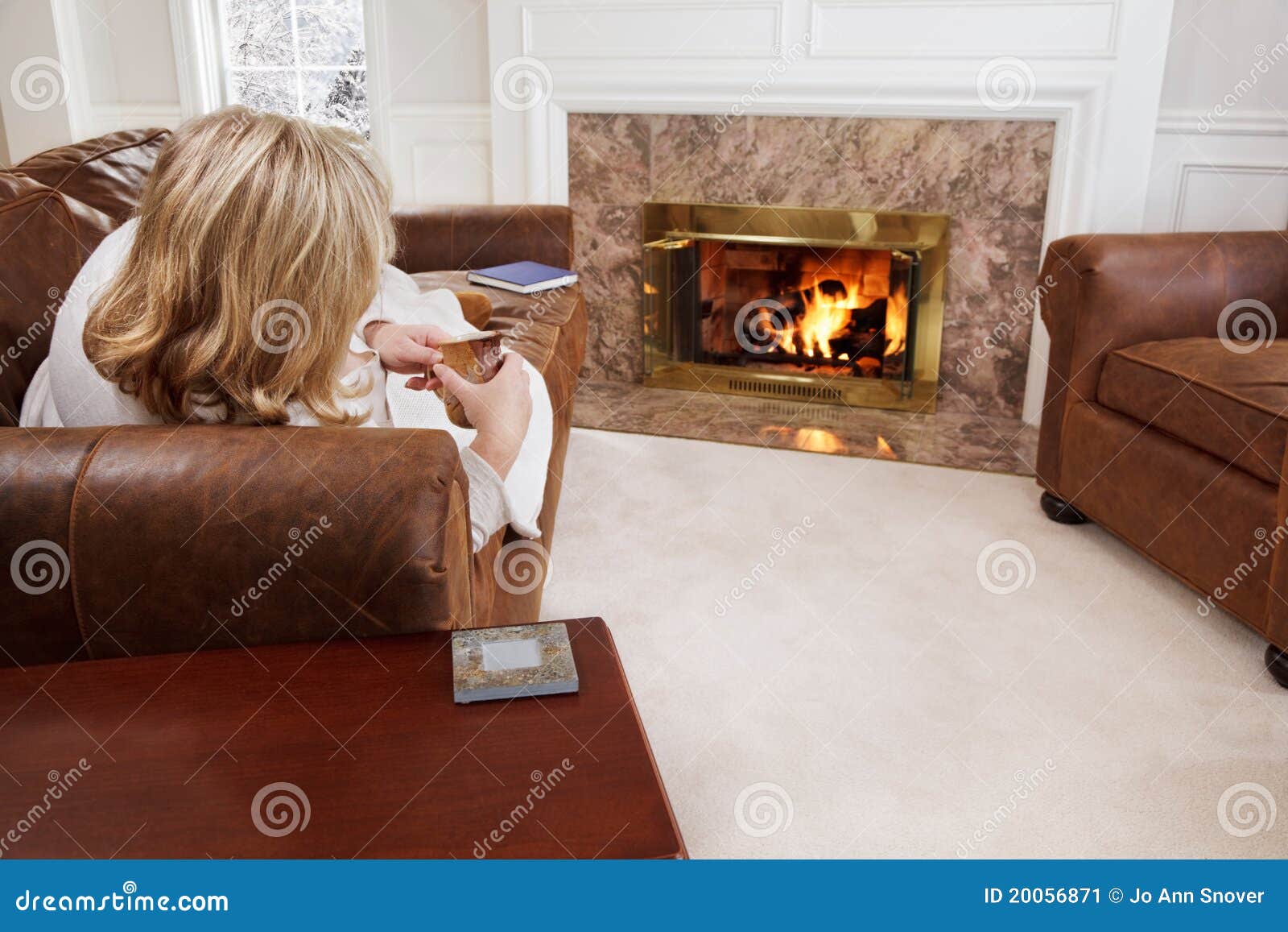 Woman relaxing by fire stock image. Image of lying, fireplace - 20056871