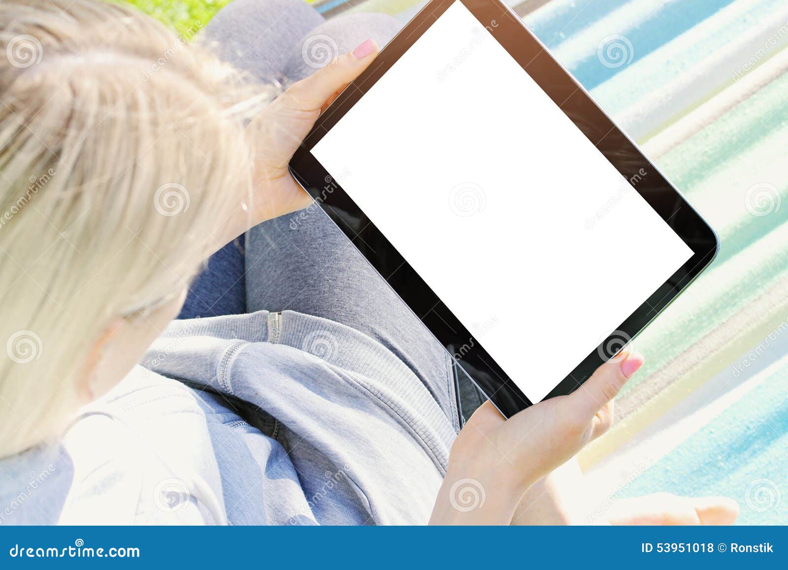 Woman Relaxing in a Hammock Using a Digital Tablet Stock Photo - Image ...