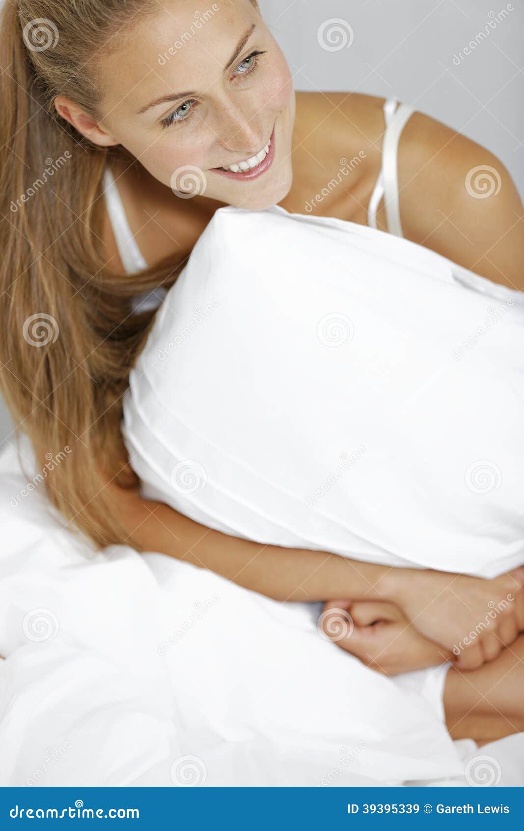 Woman relaxing on her bed stock image. Image of portrait - 39395339