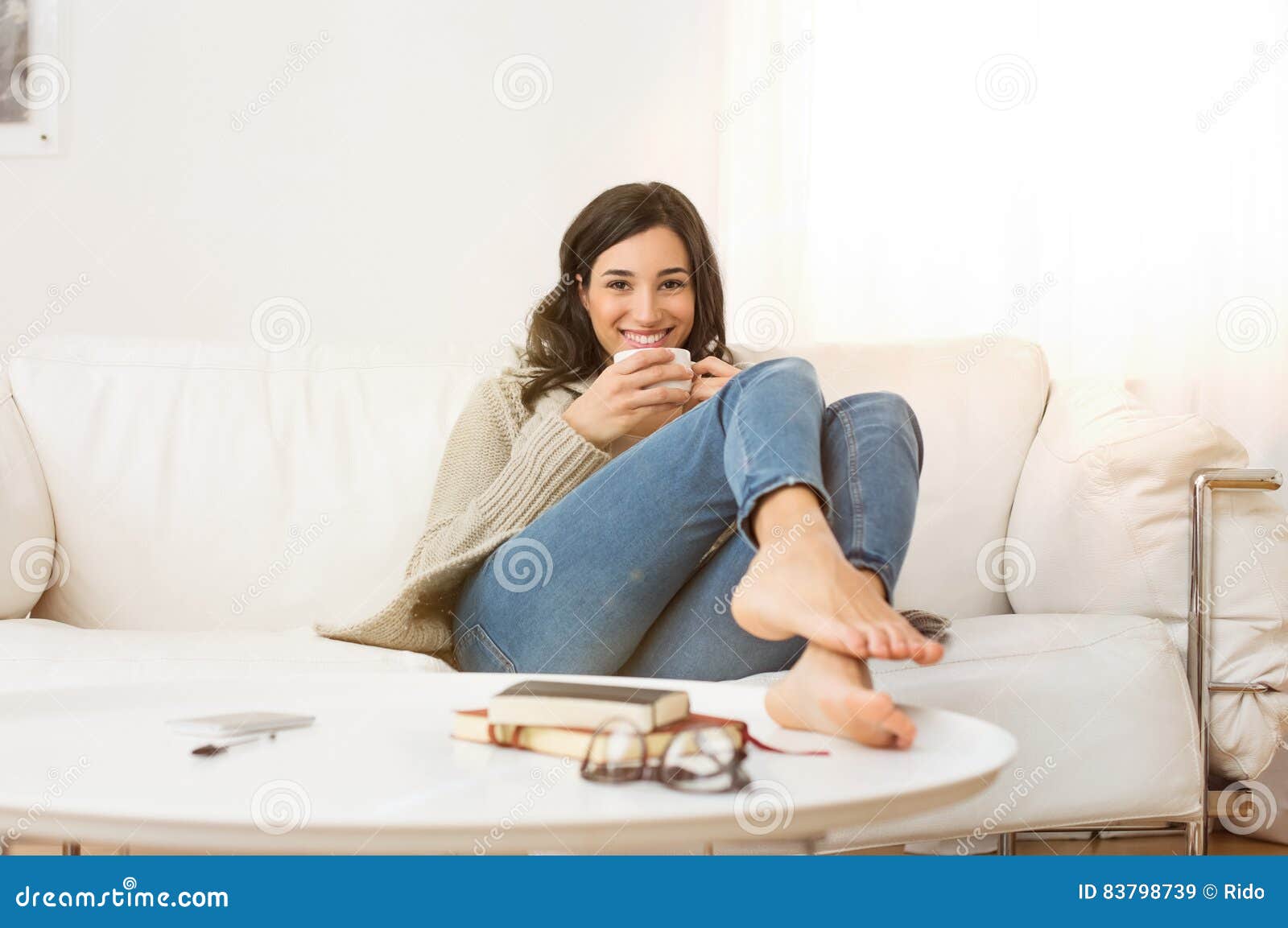 Woman relaxing at home stock image. Image of looking - 83798739 Woman relaxing at home stock image. Image of looking - 83798739