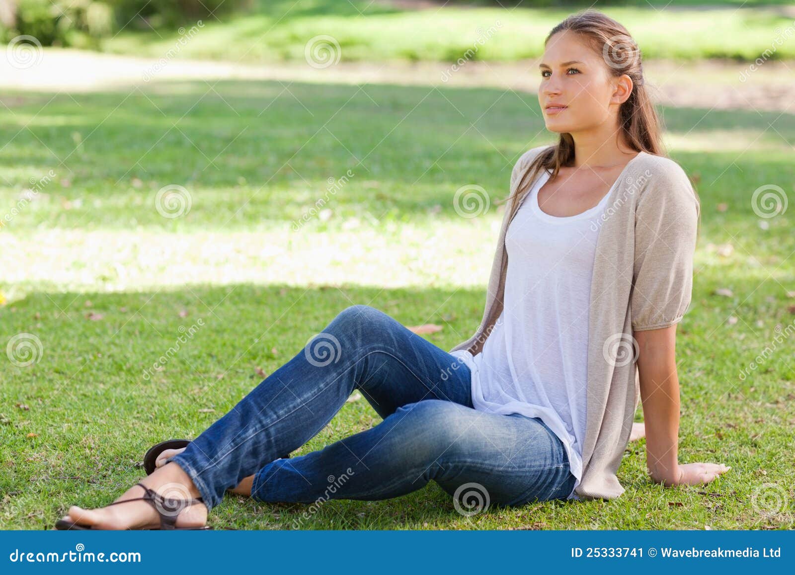 Woman relaxing on the lawn stock image. Image of ground - 25333741