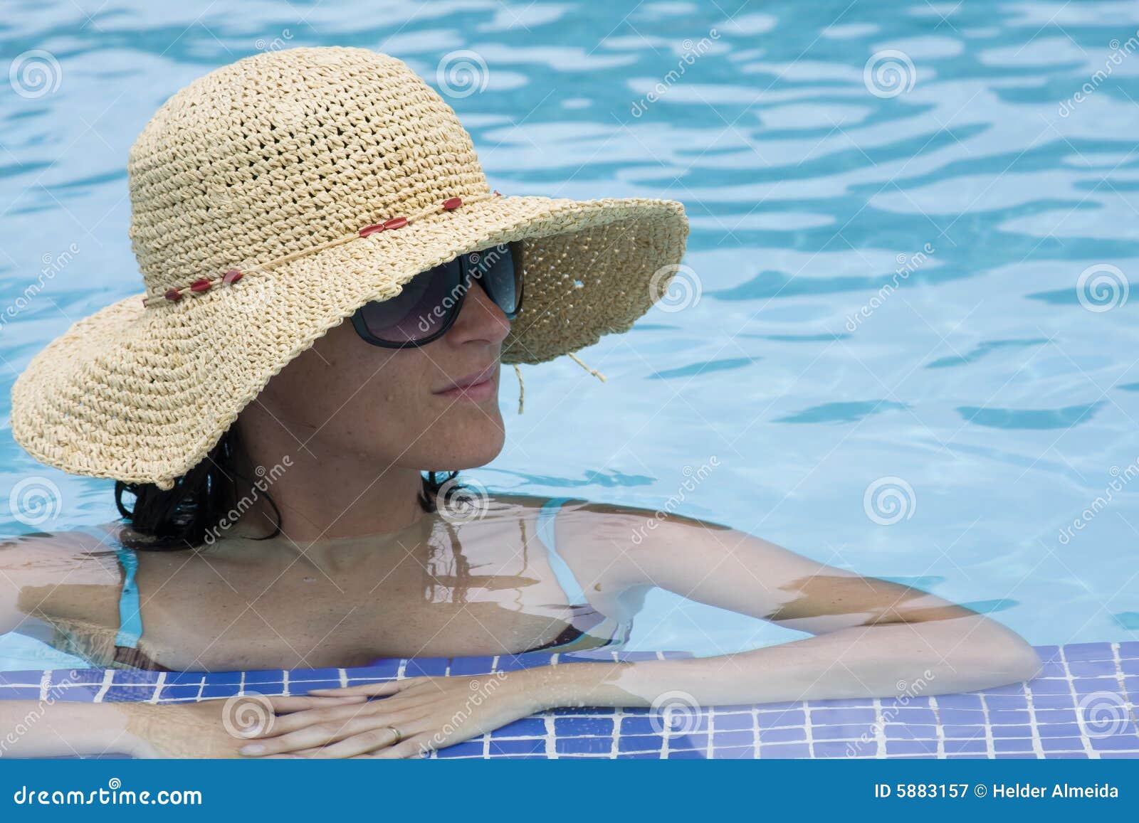 Woman relaxing in the pool stock image. Image of people - 5883157