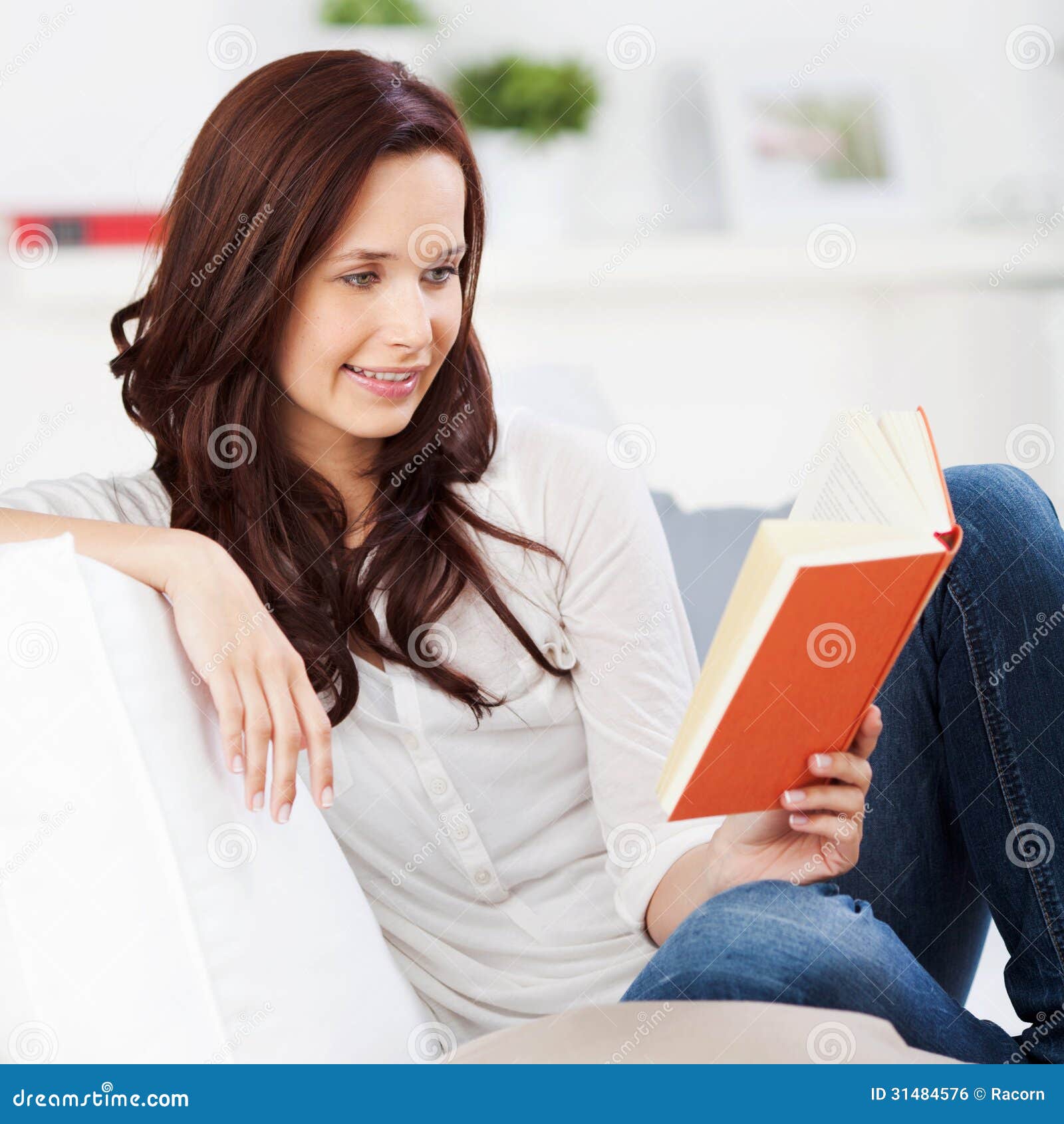 Woman Relaxing and Reading a Book Stock Photo - Image of comfortable ...