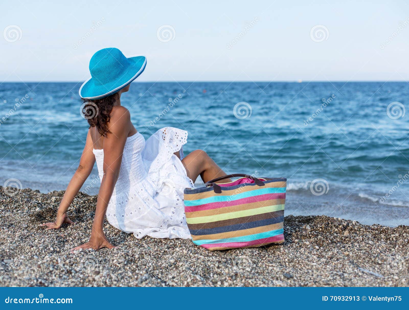 Woman Relaxing at a Seaside. Stock Image - Image of outdoors, warm ...