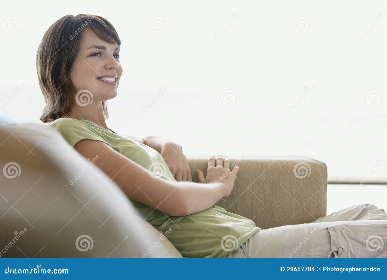 Woman Relaxing on Sofa stock photo. Image of relaxation - 29657704