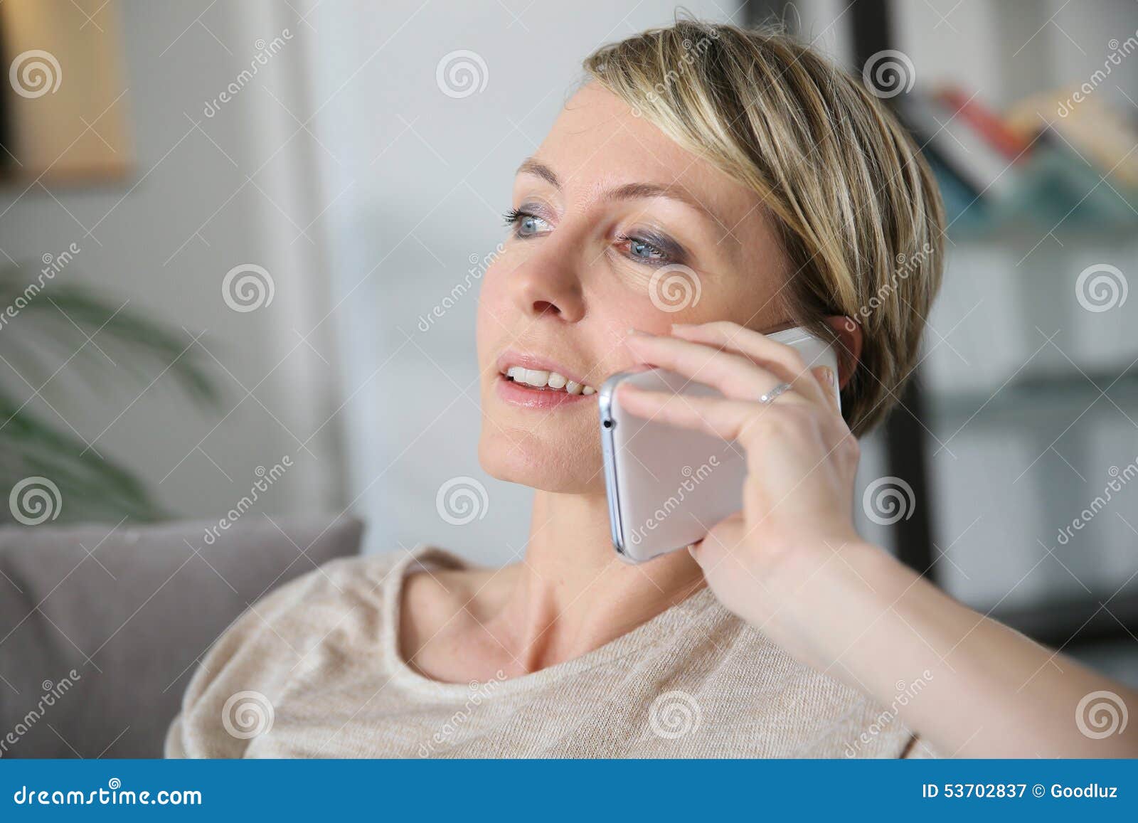 Woman Relaxing and Talking on Smartphone Stock Image - Image of ...