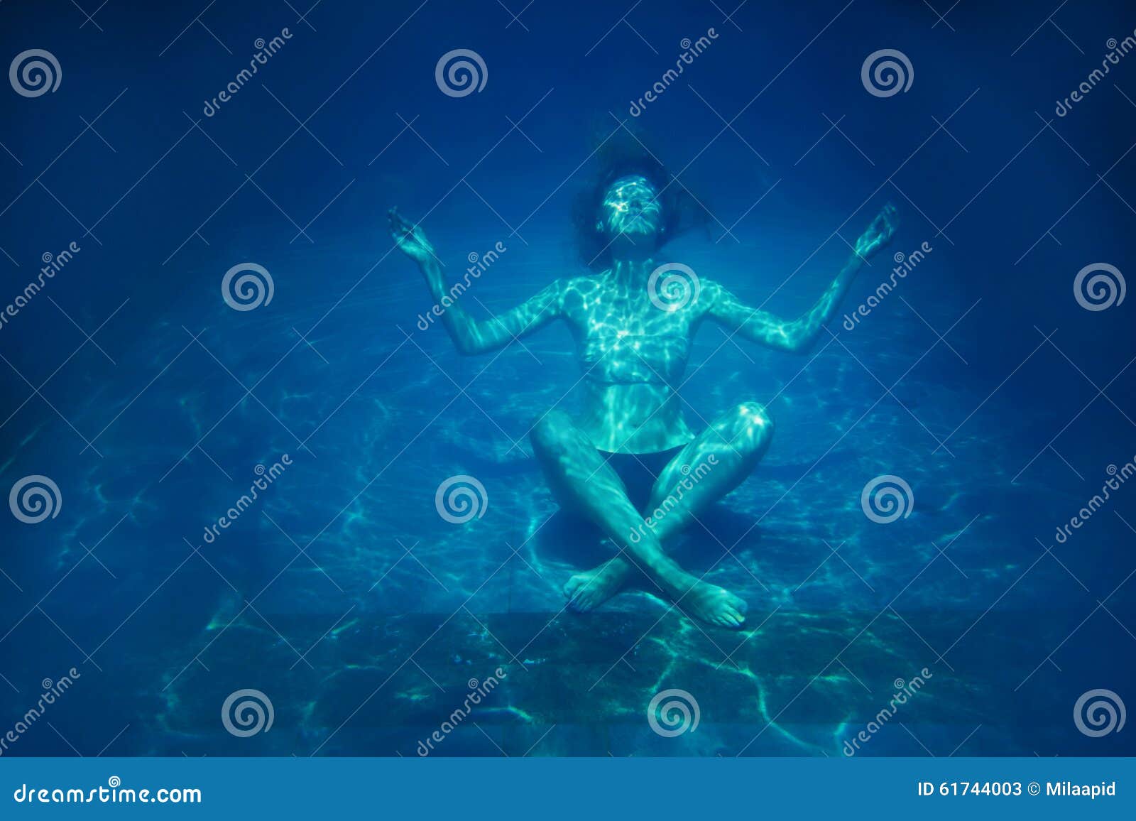 Woman relaxing under water stock image. Image of light - 61744003