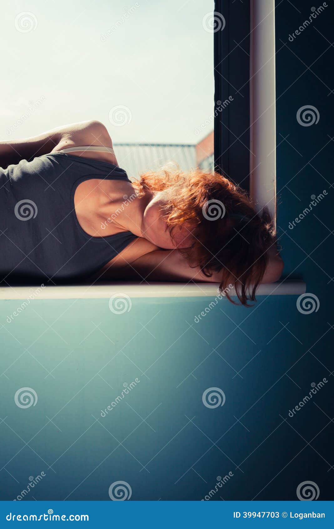 Woman relaxing by window stock image. Image of person - 39947703