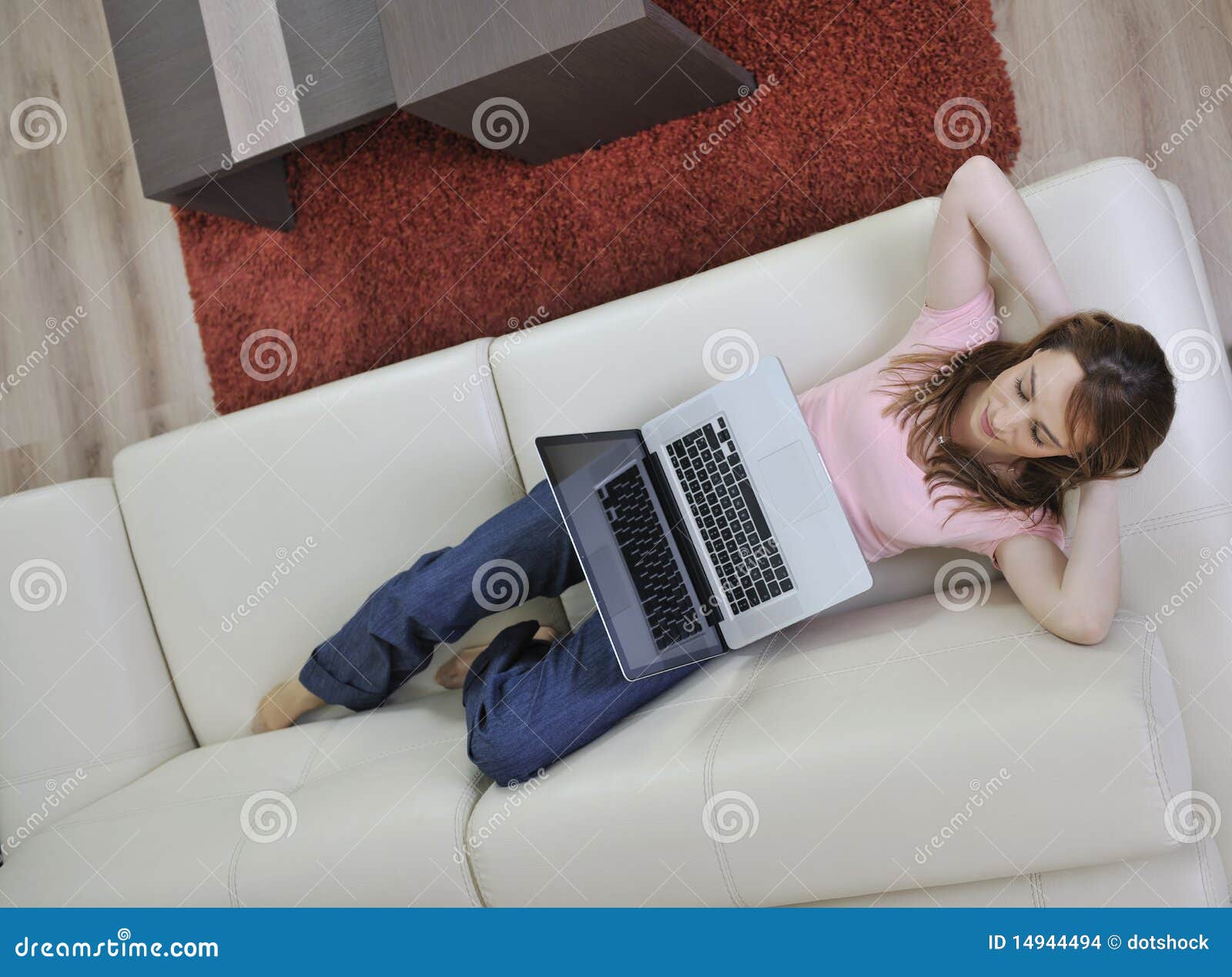 Woman Relaxing And Working On Laptop At Home Stock Photo - Image of ...