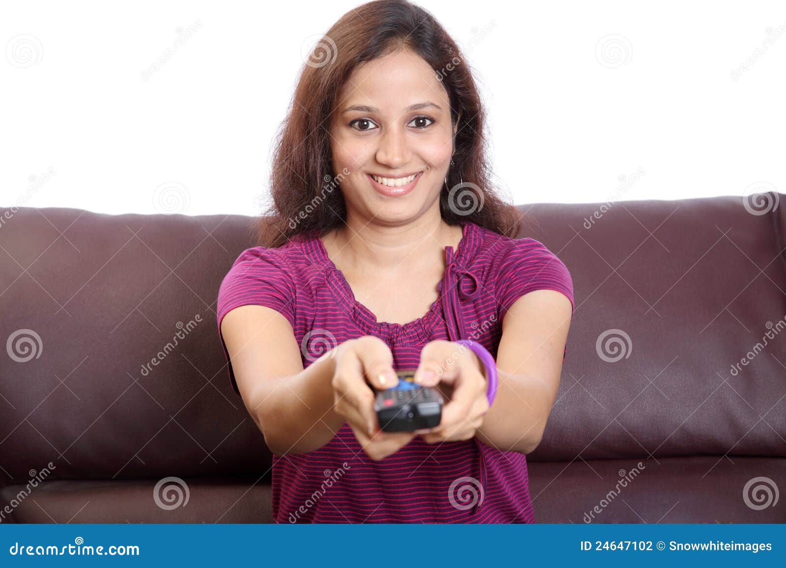 Woman with remote control stock photo. Image of remote - 24647102