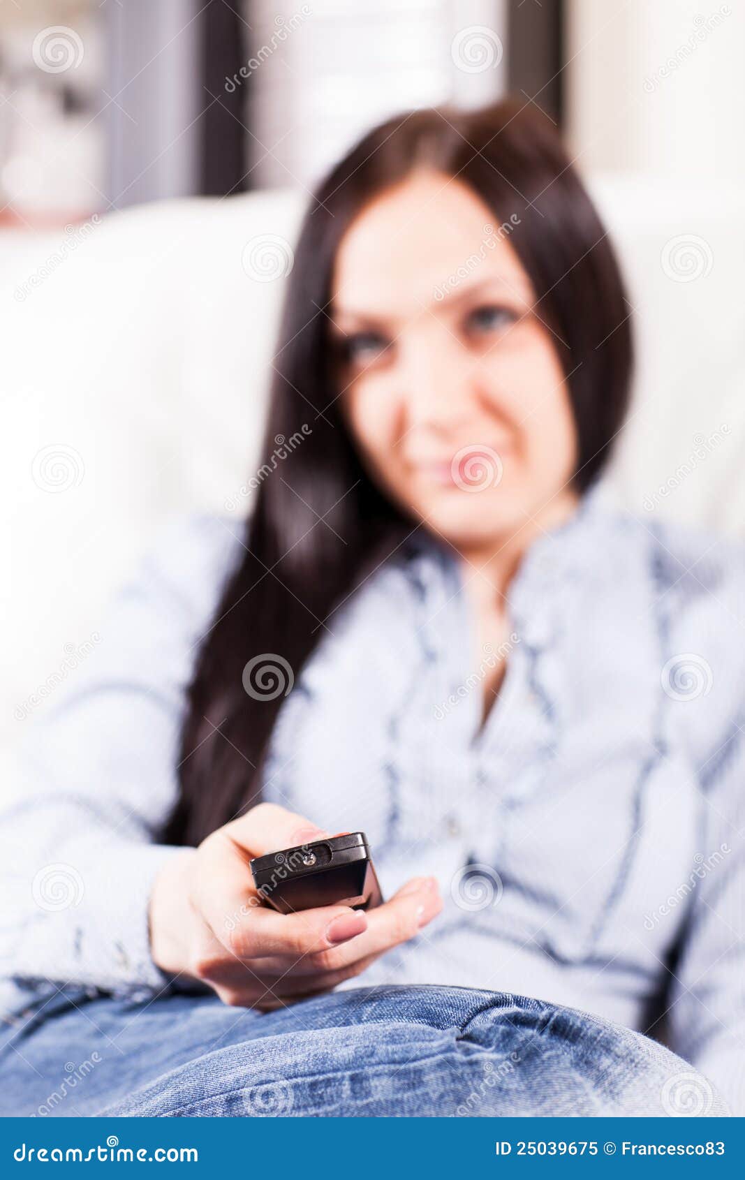 Woman with remote control stock image. Image of hair - 25039675