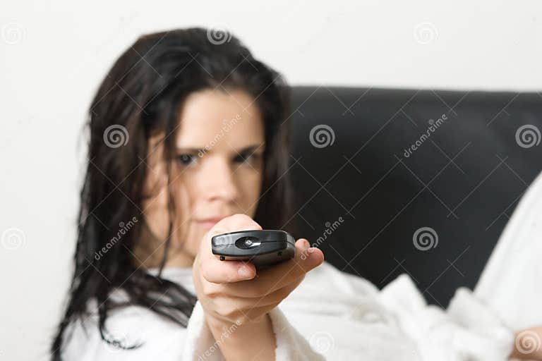 Woman with remote control stock image. Image of cosy, attention - 4971139