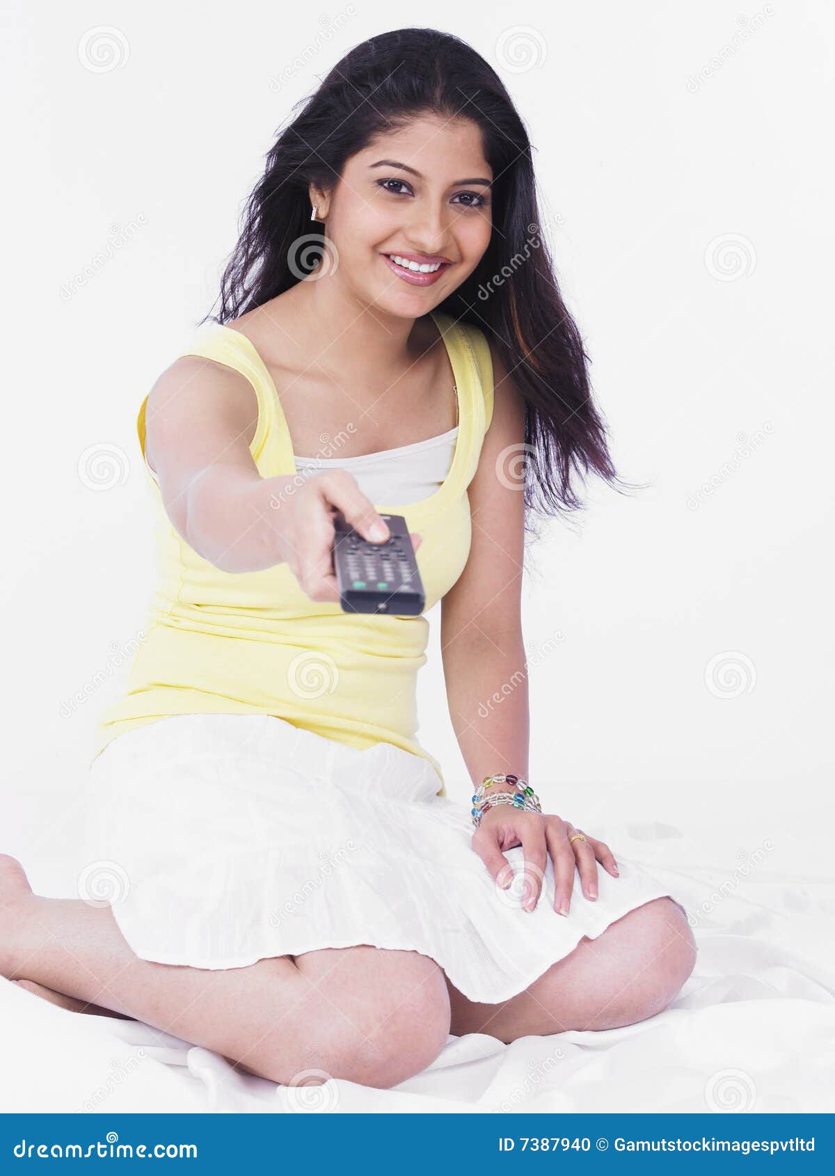Woman with a Remote Control Stock Photo - Image of adult, face: 7387940