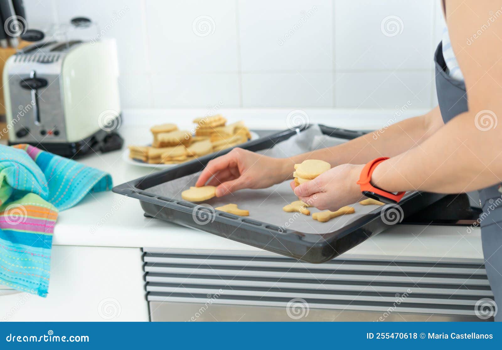 Woman Removing Cookies from the Baking Sheet. Home Cooking. Copy Space ... Woman Removing Cookies from the Baking Sheet. Home Cooking. Copy Space ...
