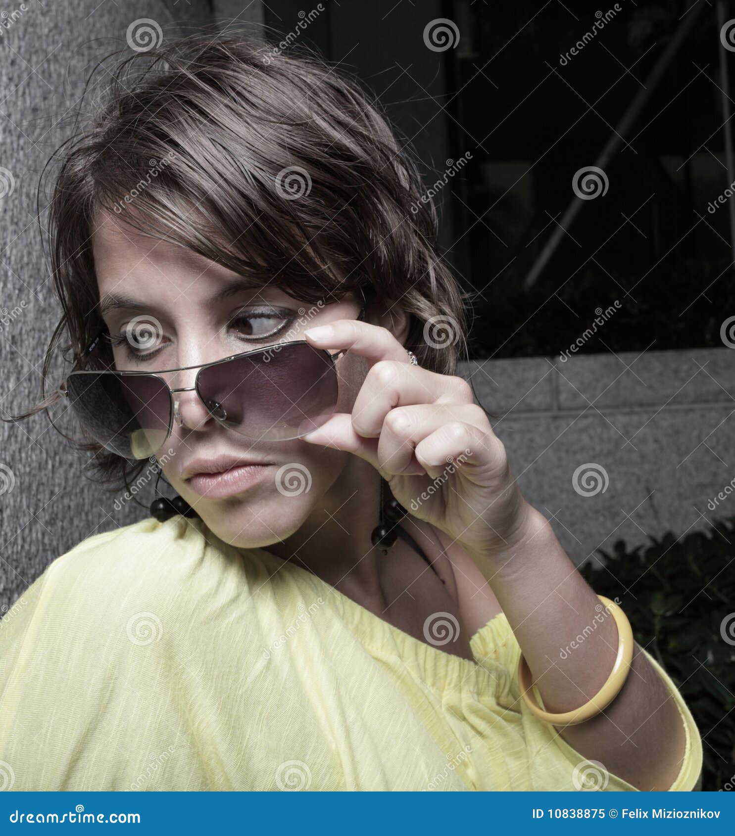 Woman removing her shades stock image. Image of beautiful - 10838875
