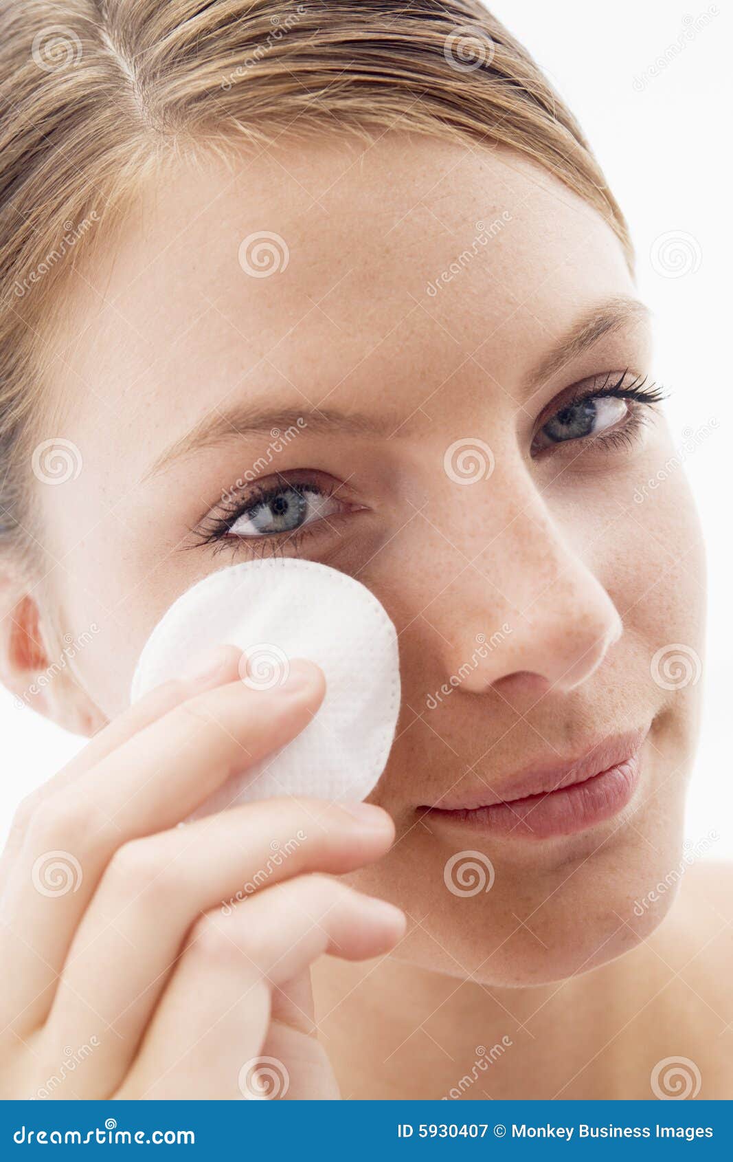 Woman removing makeup stock image. Image of attractive - 5930407