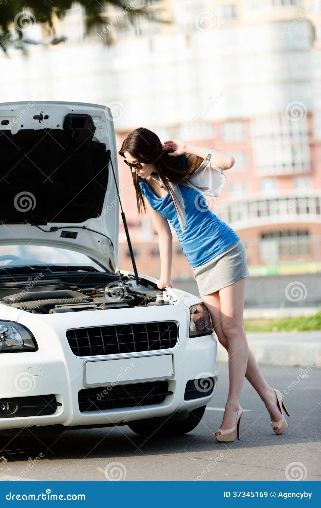 Woman Repairing The Broken Cabriolet On The Street Stock Image Image