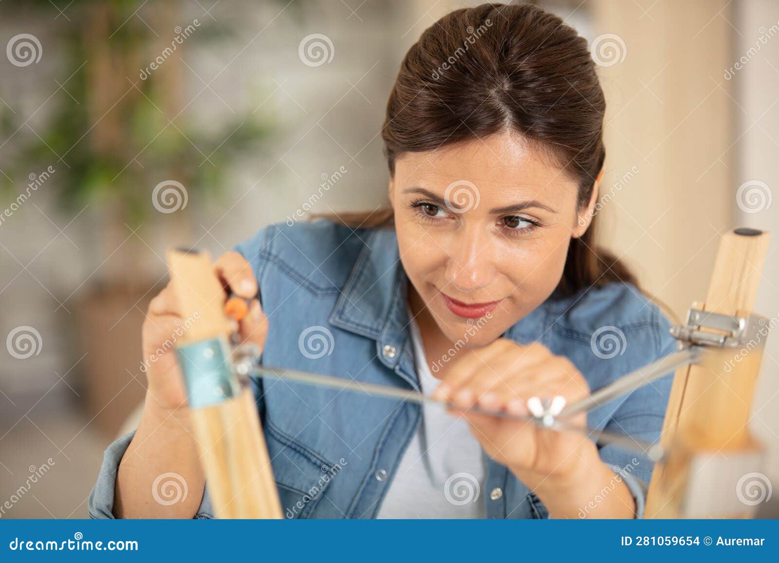 Woman Replacing Light Bulb at Home Stock Photo - Image of girl ...