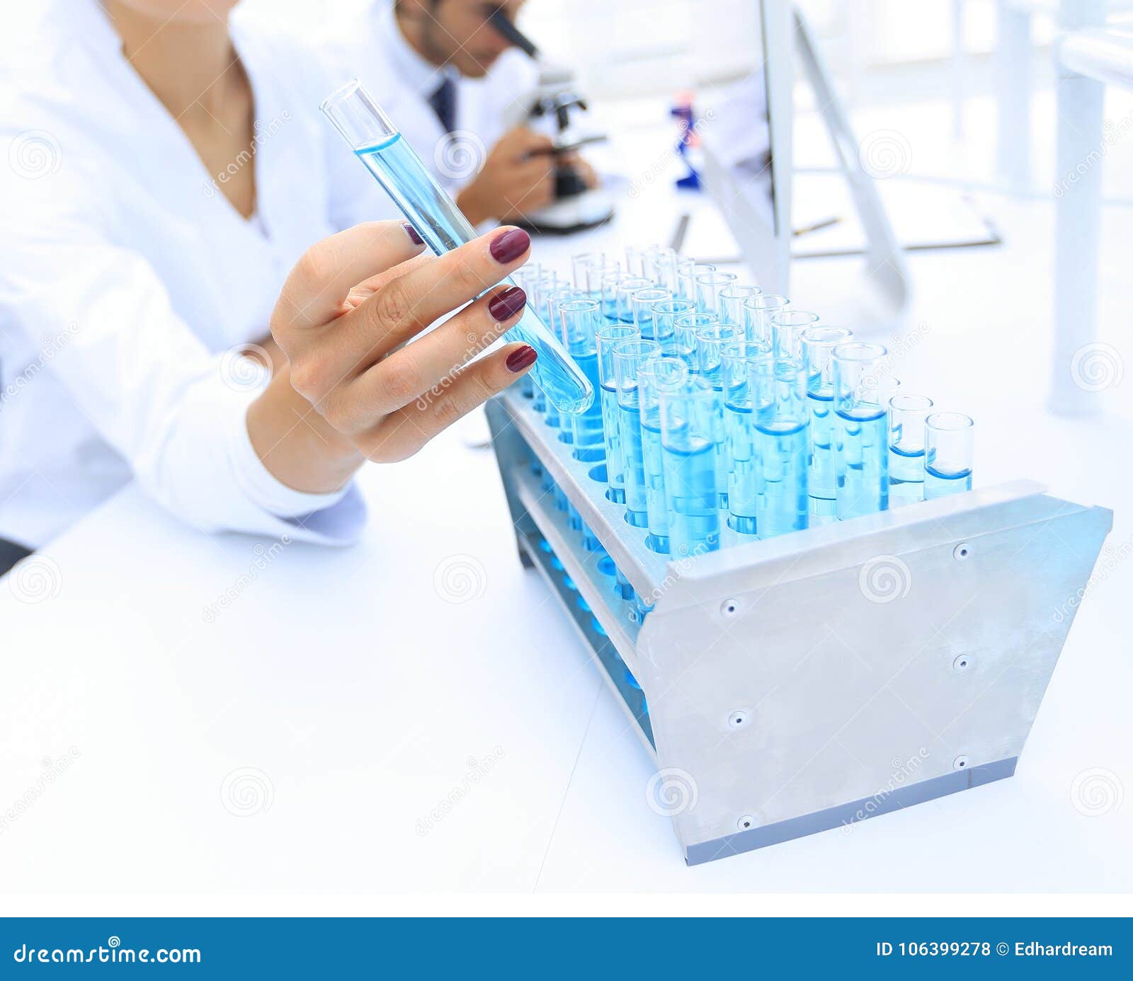 Woman Researcher is Surrounded by Medical Vials and Flasks Stock Photo ...