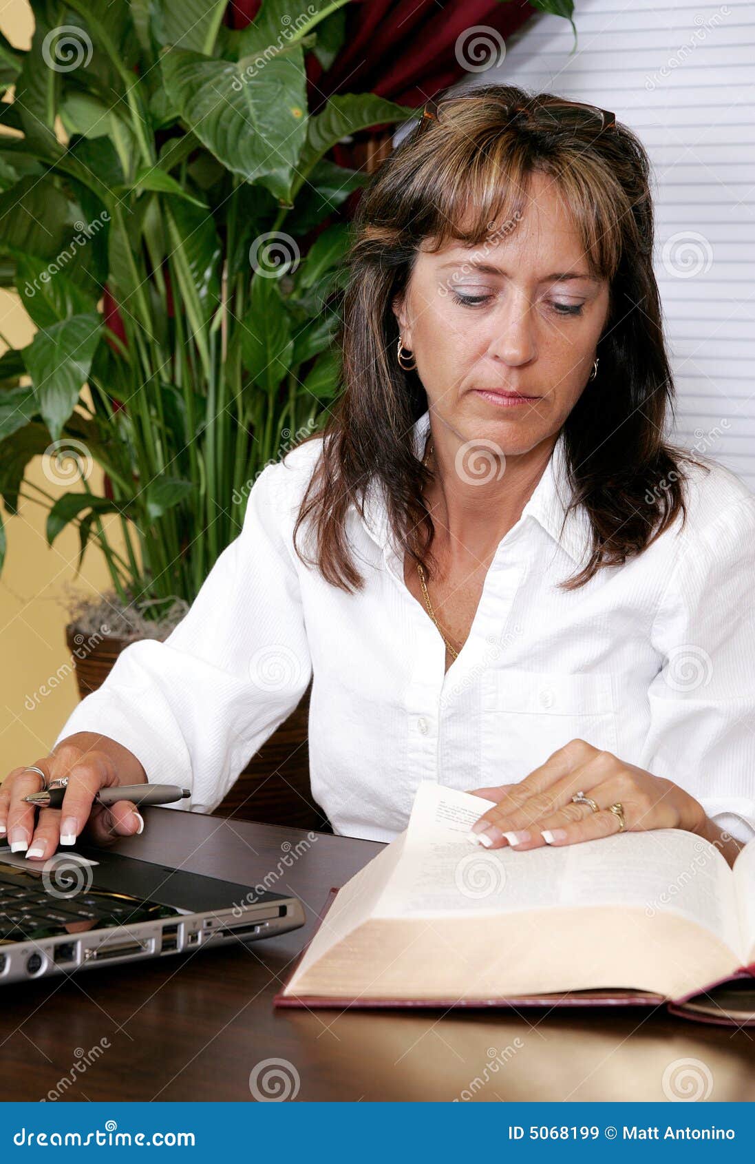 Woman researching in books stock image. Image of woman - 5068199
