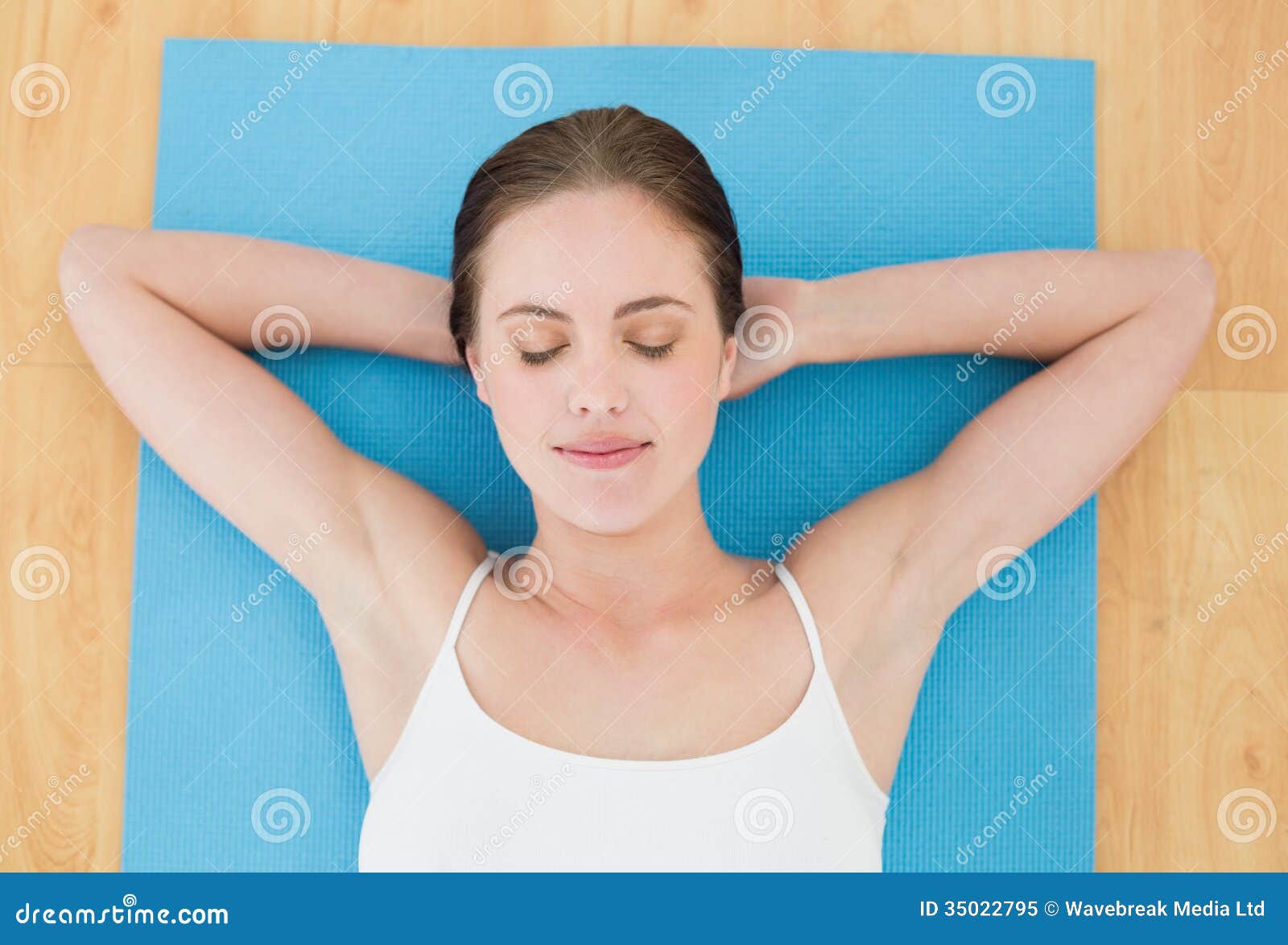 Woman Resting on Exercise Mat with Eyes Closed Stock Image - Image of ...