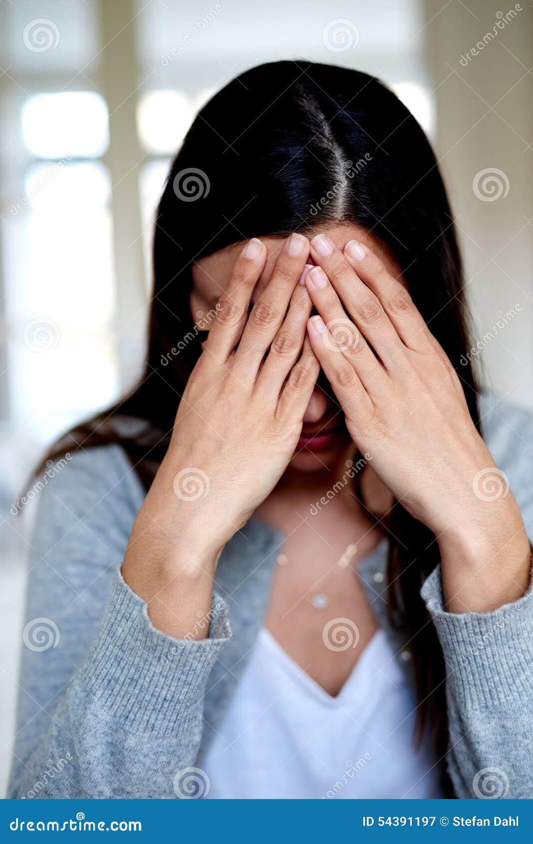 Woman Resting Her Forehead Against Hands. Stock Image - Image of ...