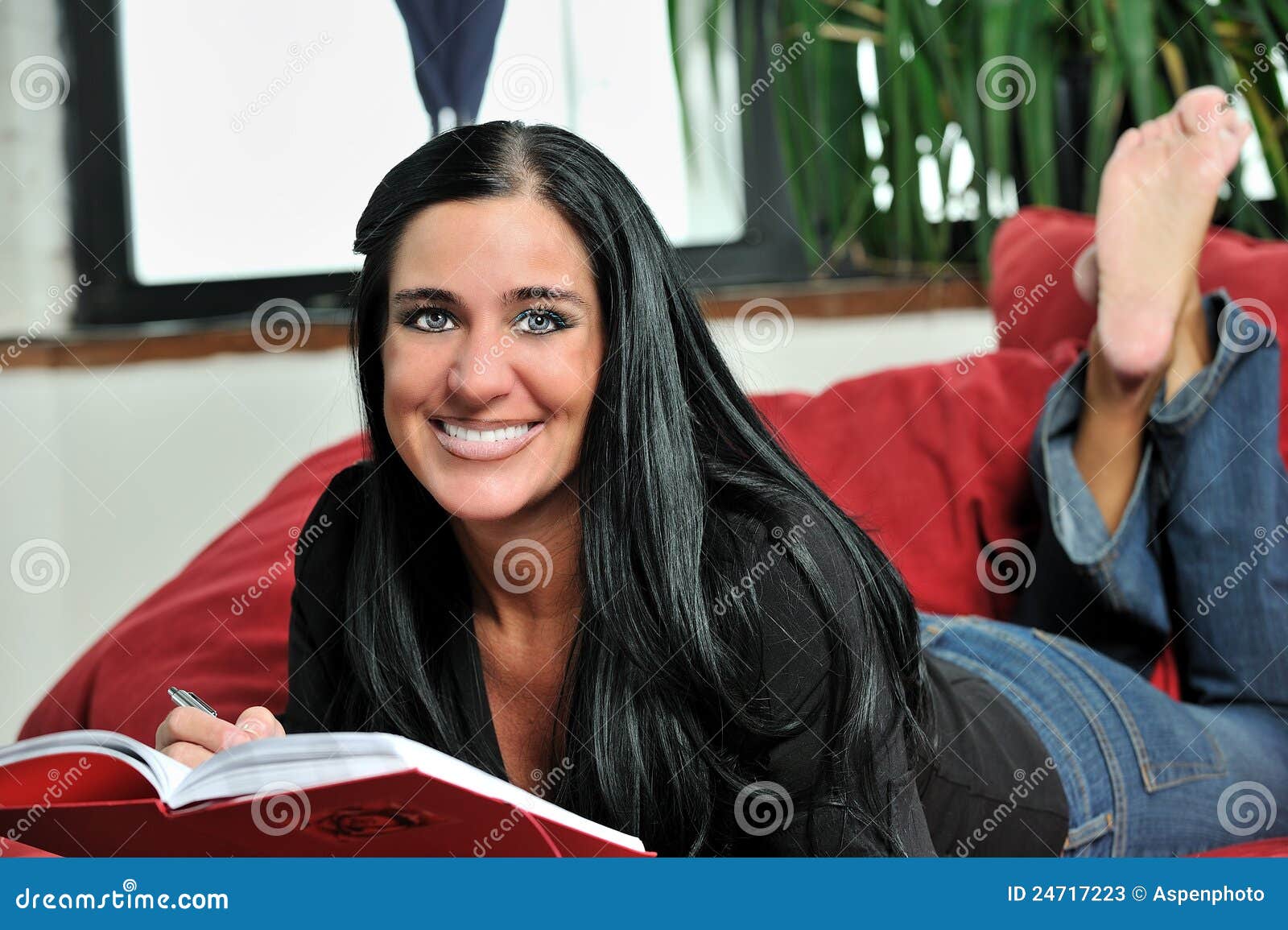 Woman Resting in Living Room Writing Stock Image - Image of relax ...