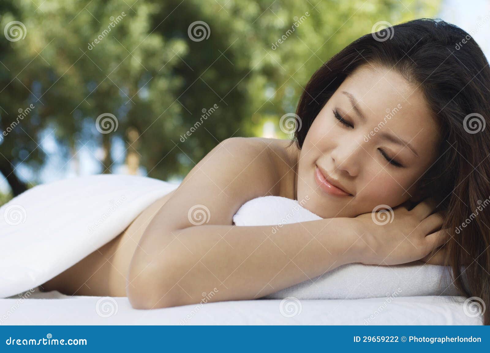 Woman Resting on Massage Table Outdoors Stock Photo - Image of ...