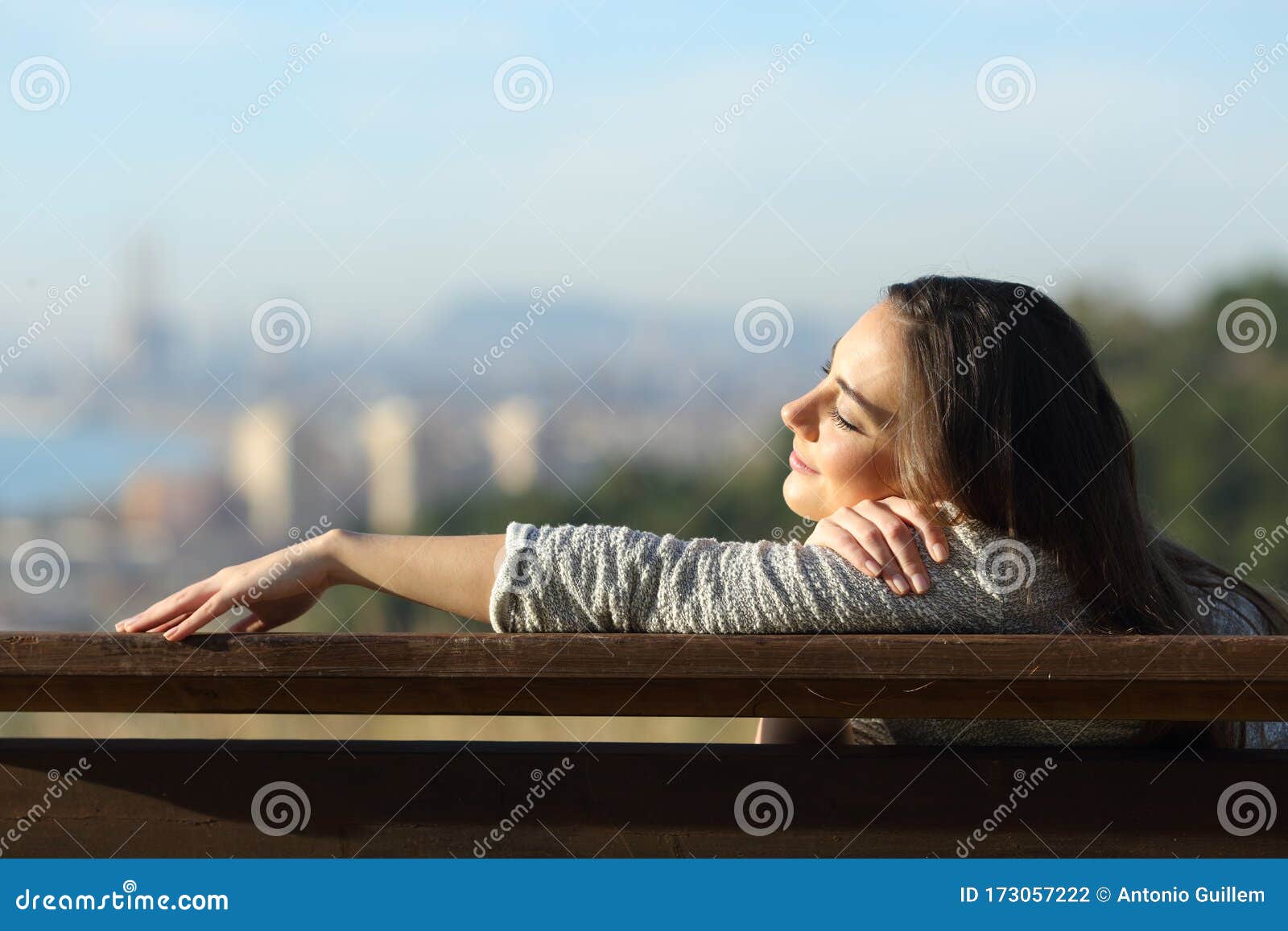 Woman Resting Napping on a Bench in City Outtskirts Stock Photo - Image ...