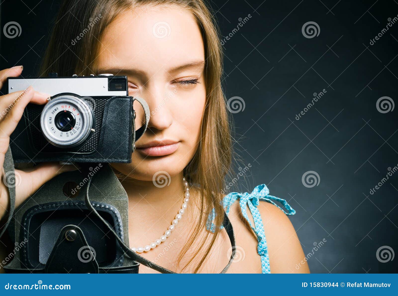 Woman with a retro camera stock photo. Image of girl - 15830944