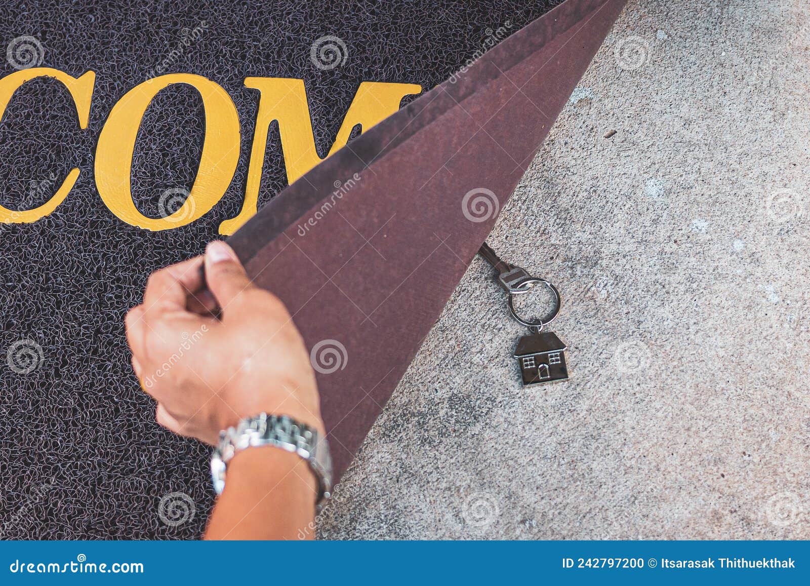 Woman Revealing Hidden Key Under Doormat Stock Photo - Image of doormat ...